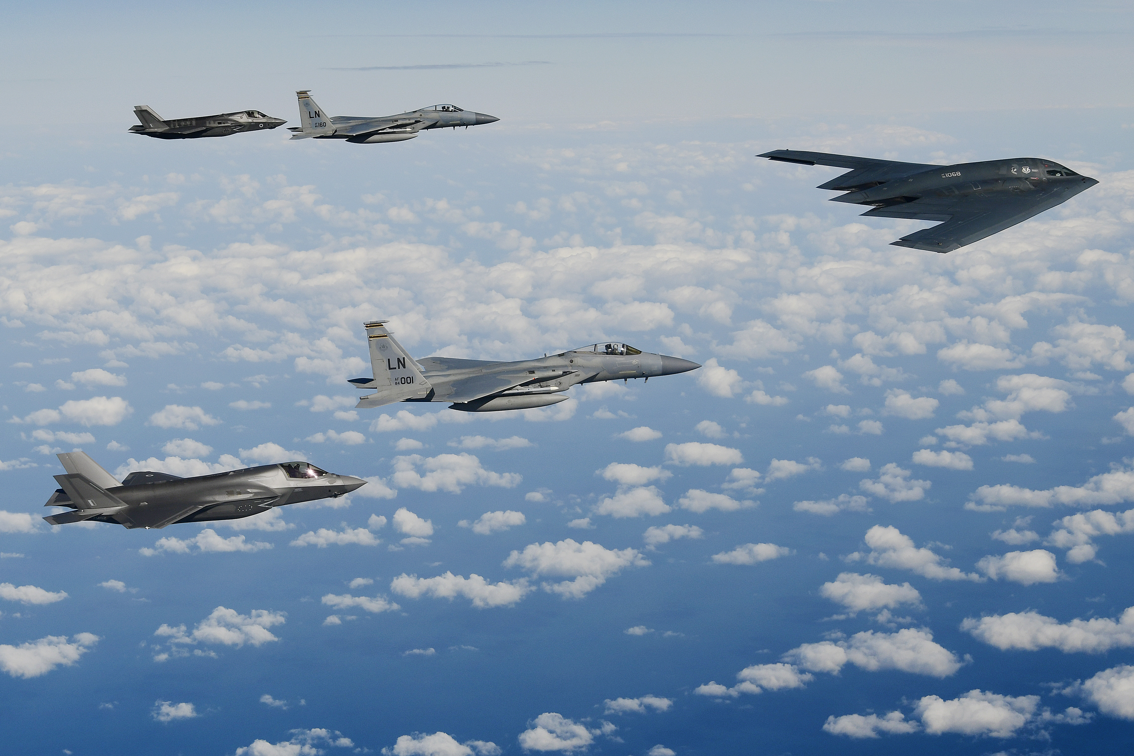 USAF bombers conduct training flights with US F-15 and UK F-35s in ...