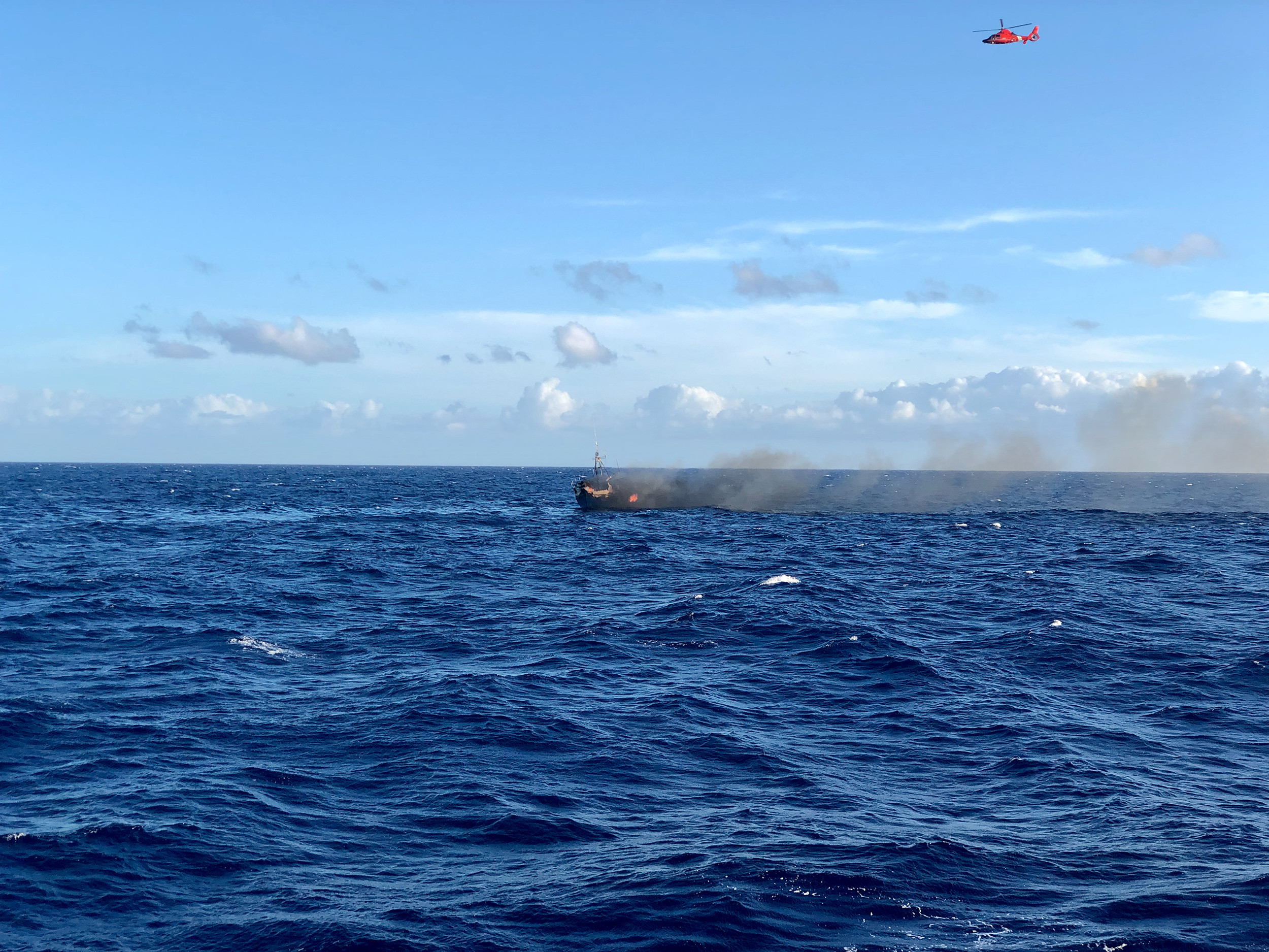 Coast Guard Rescues 7 Mariners from Vessel on Fire off Oahu