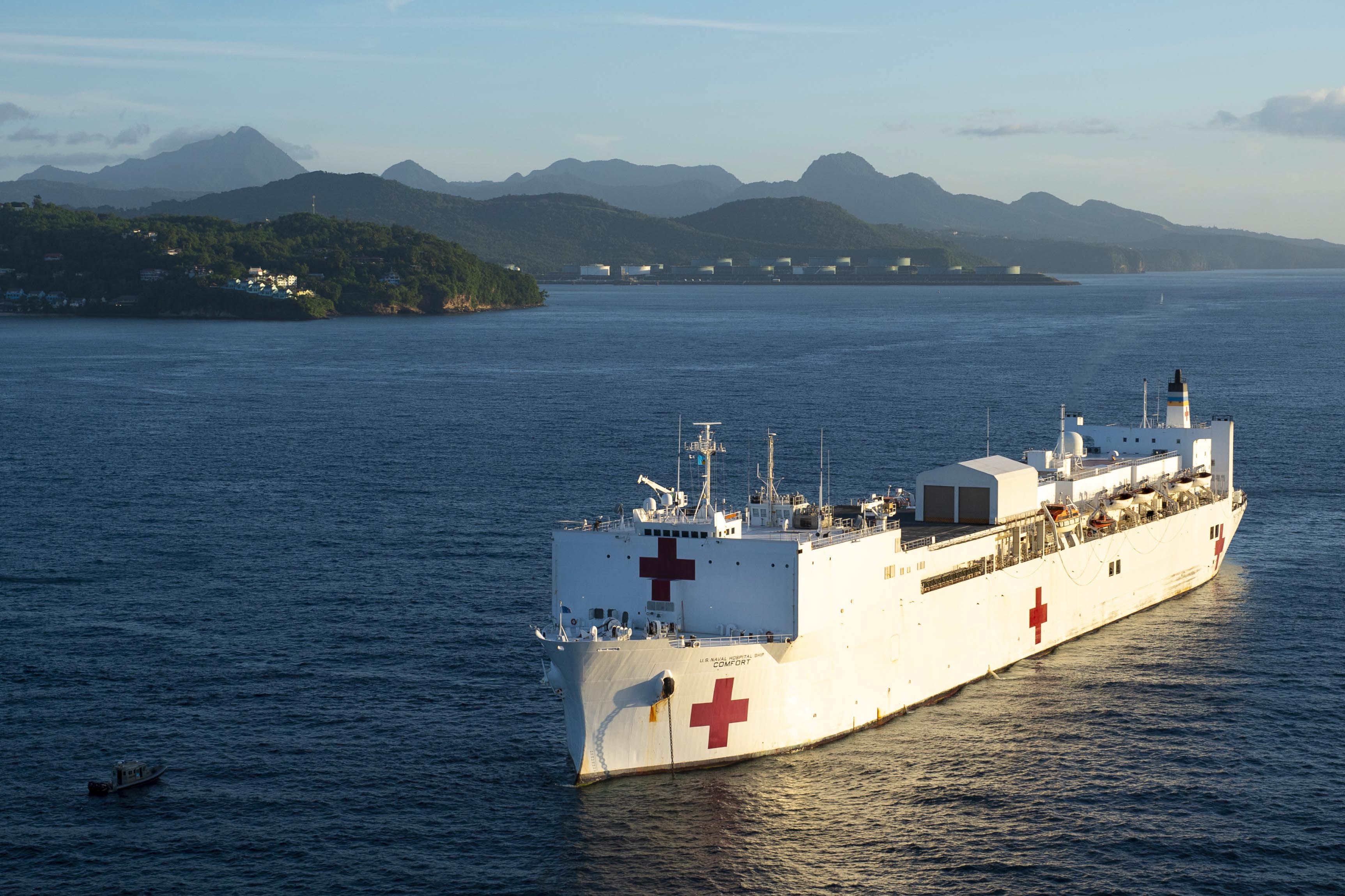 The hospital ship USNS Comfort is anchored off the coast of Castries ...