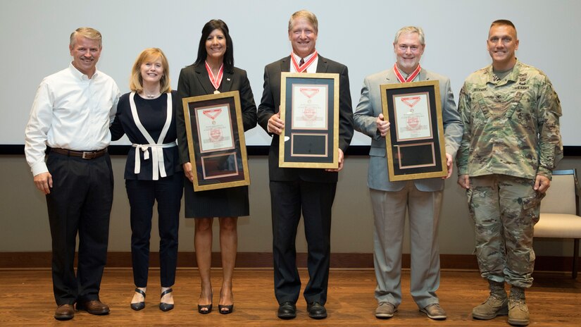 Three U.S. Army Engineer Research and Development Center executive staff members receive de ...