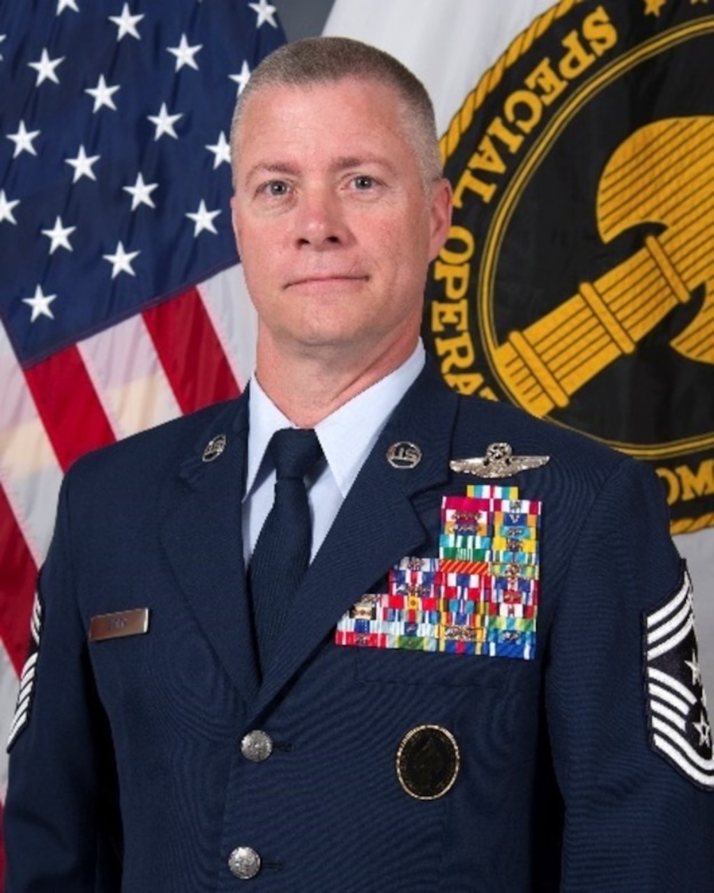 Gregory A. Smith > U.S. Department of War > Biography