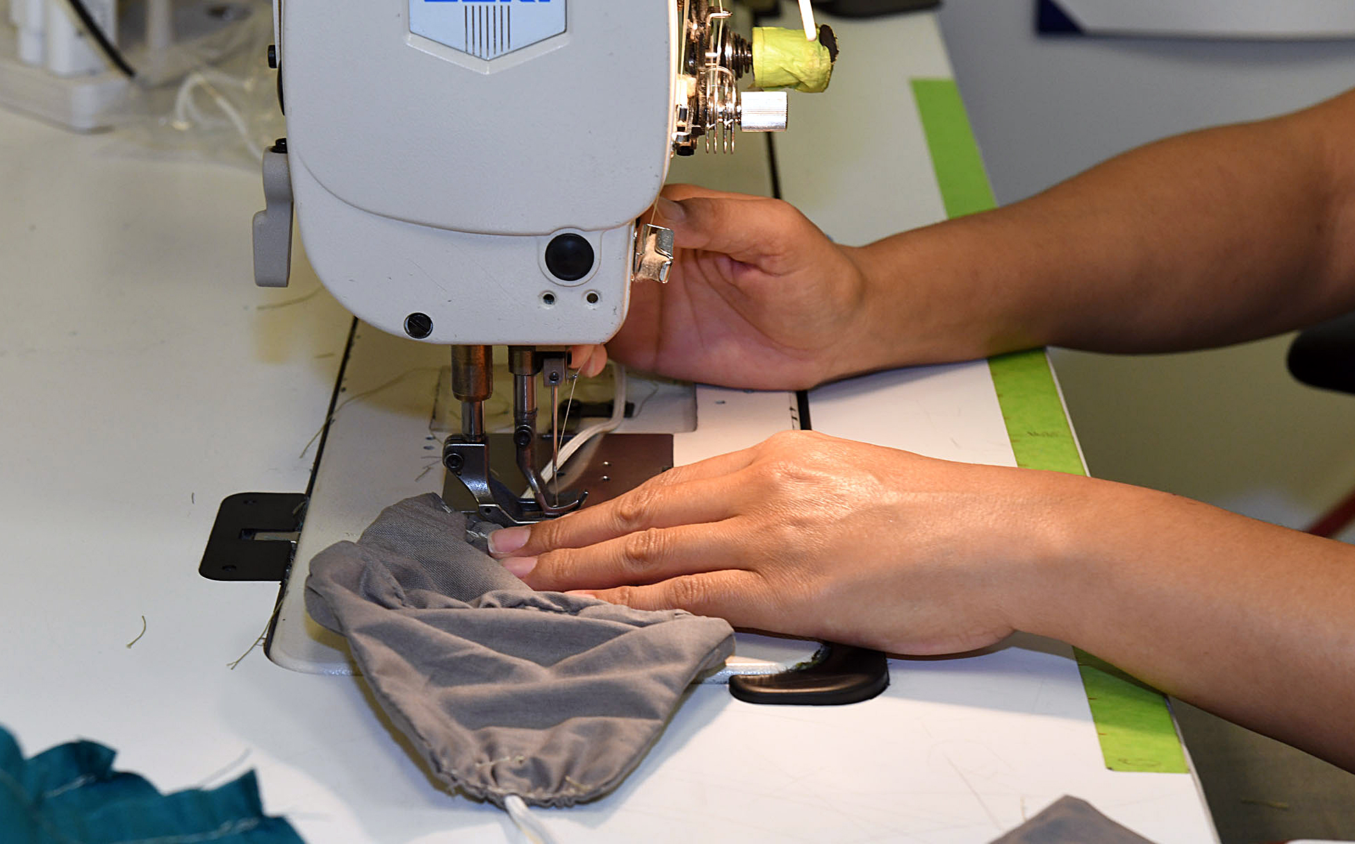 Keeping Team Robins Covered: Fabric Shop makes masks while maintaining ...