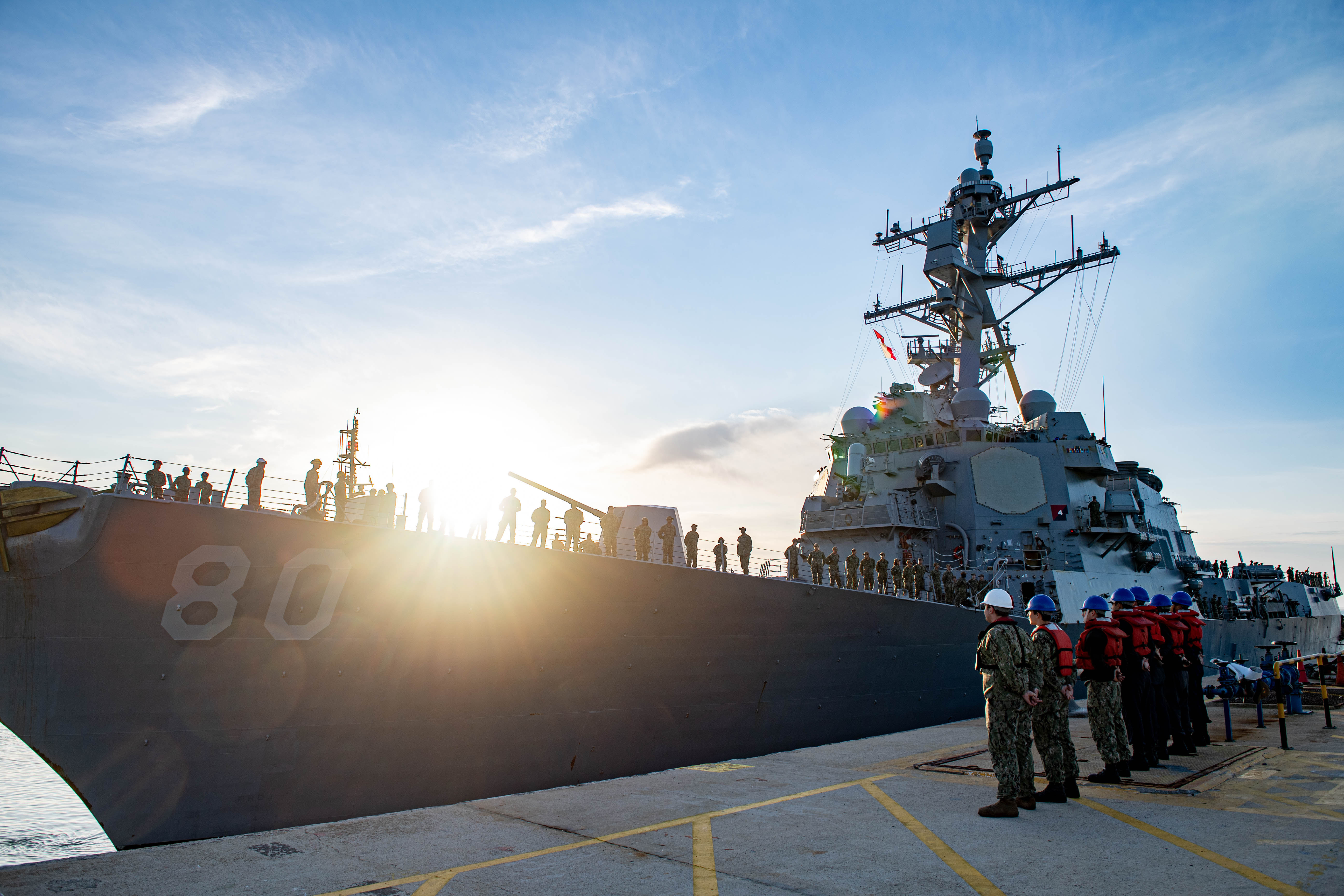 Commander Task Force 65 and USS Roosevelt’s leadership sync on the pier ...
