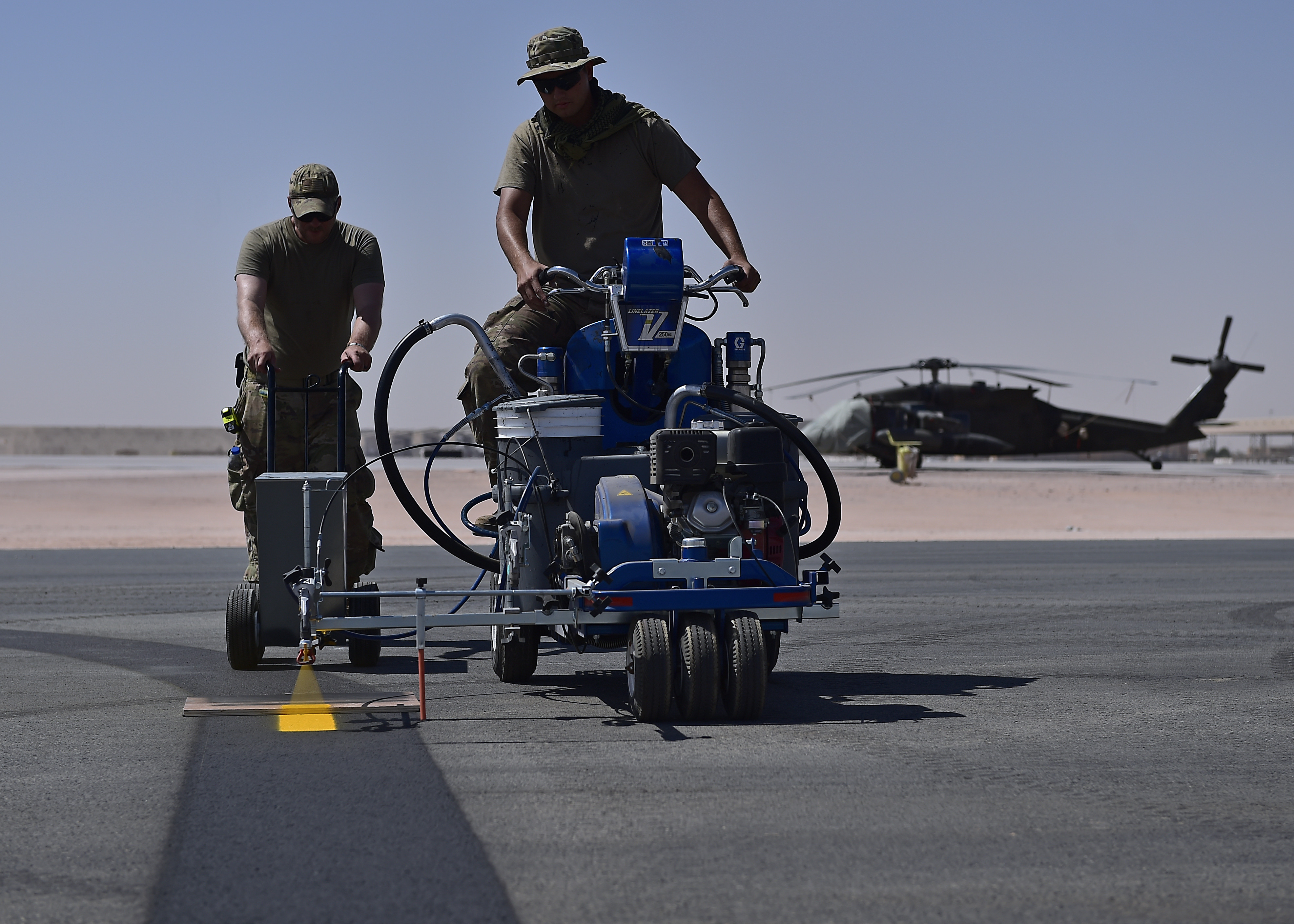 378 ECES paint new UH-60 helipad > U.S. Air Forces Central > 378th Air ...