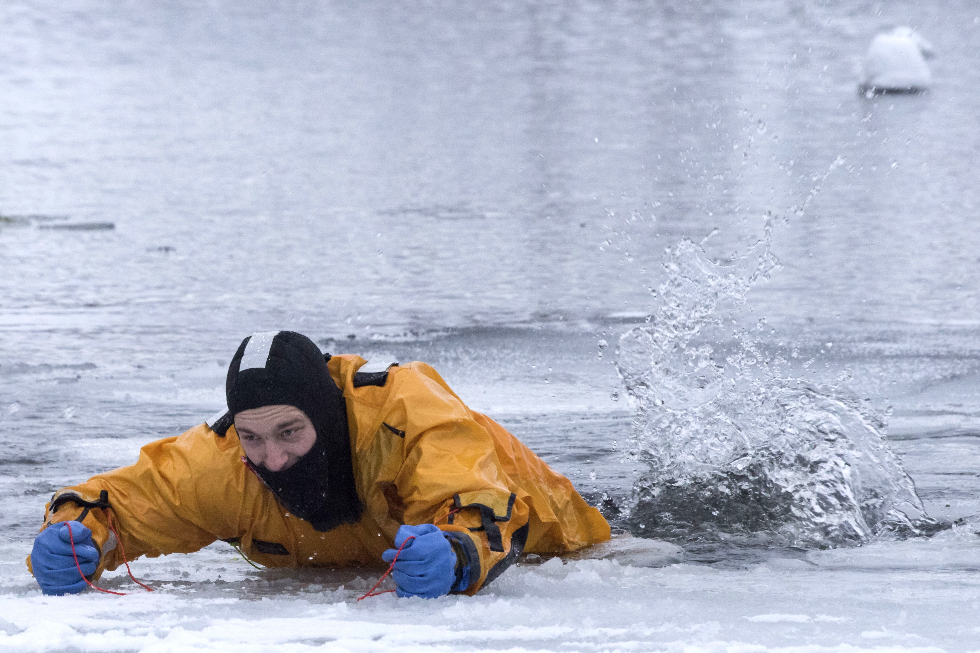 JBER firefighters conduct ice rescue training
