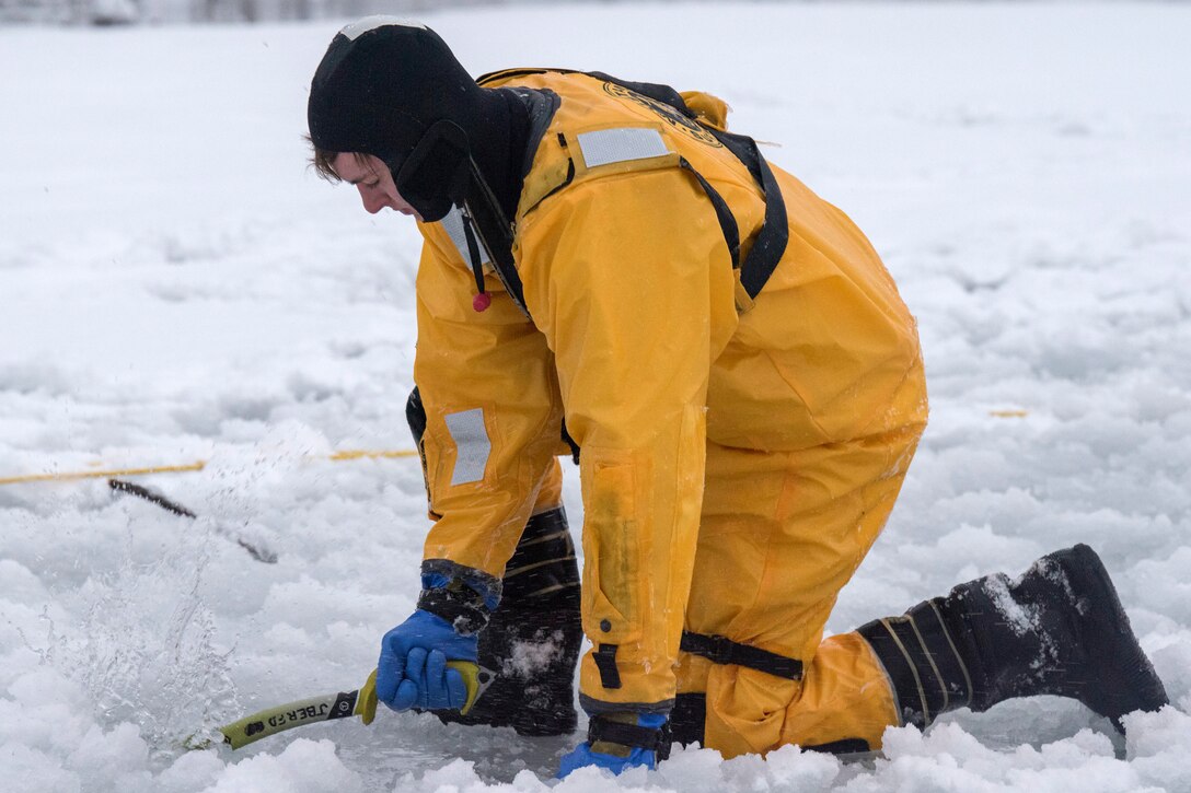 JBER firefighters conduct ice rescue training