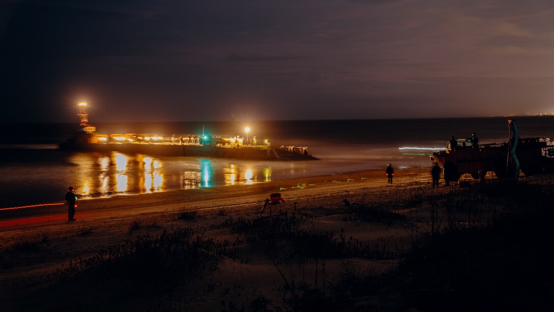 U.S. Marines and Sailors Offload Tactical Vehicles During MPFEX 20