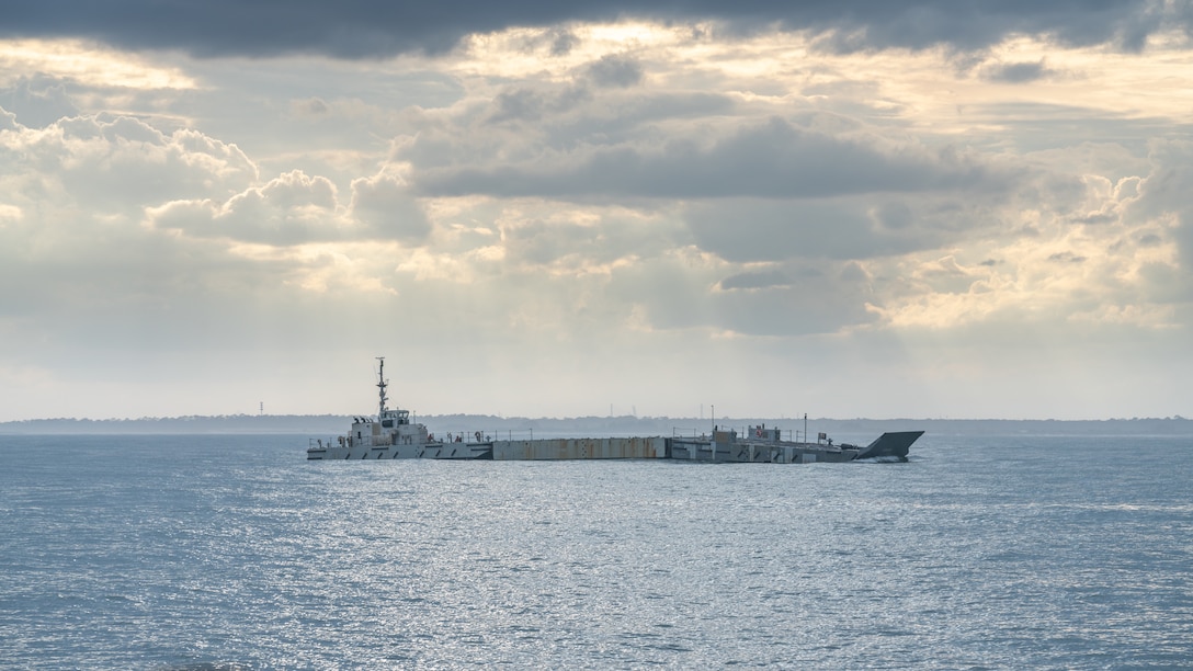 U.S. Marines and Sailors Offload Tactical Vehicles During MPFEX 20