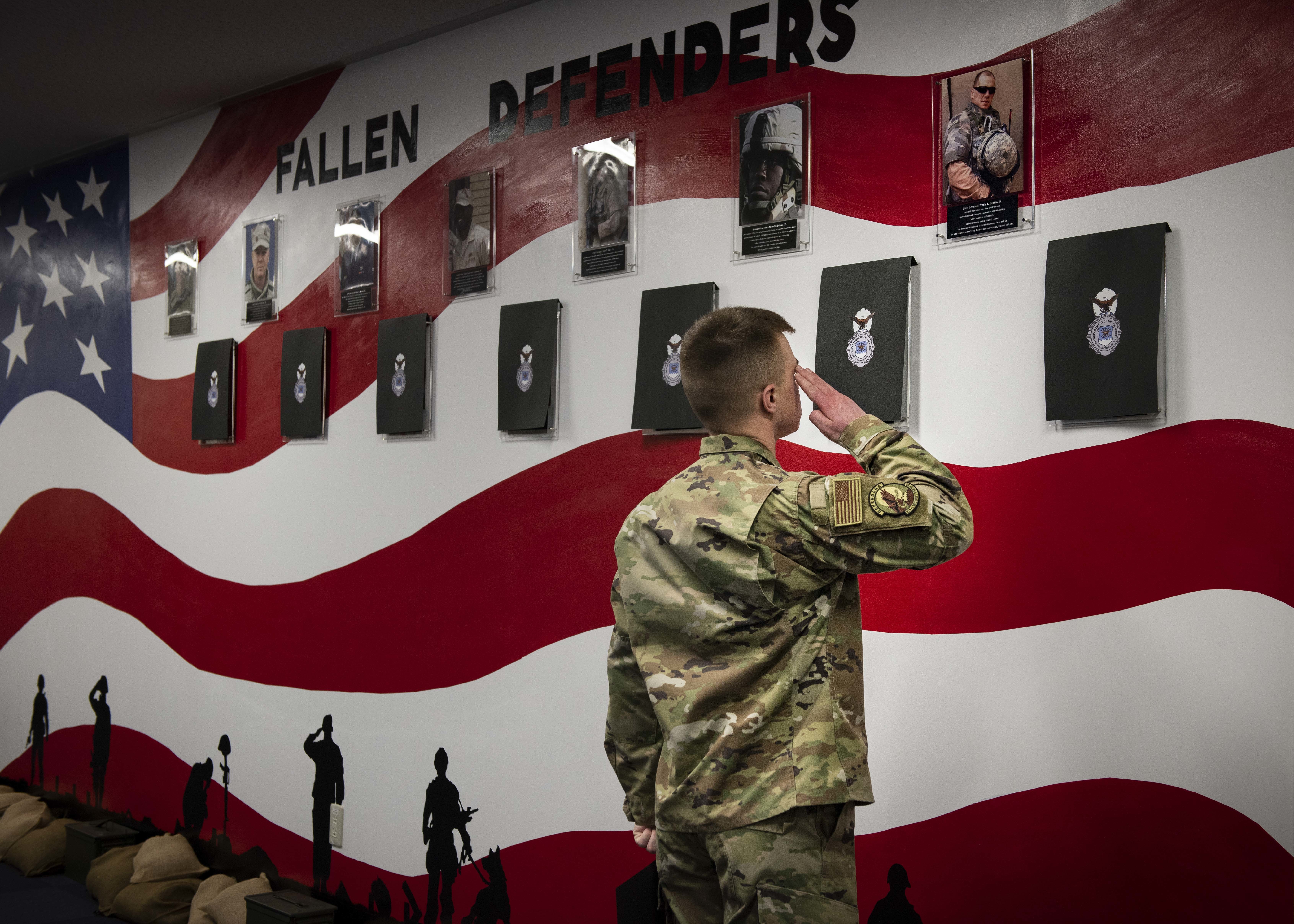 374th SFS Airmen honor Fallen Defender comrades with a mural > Seventh ...
