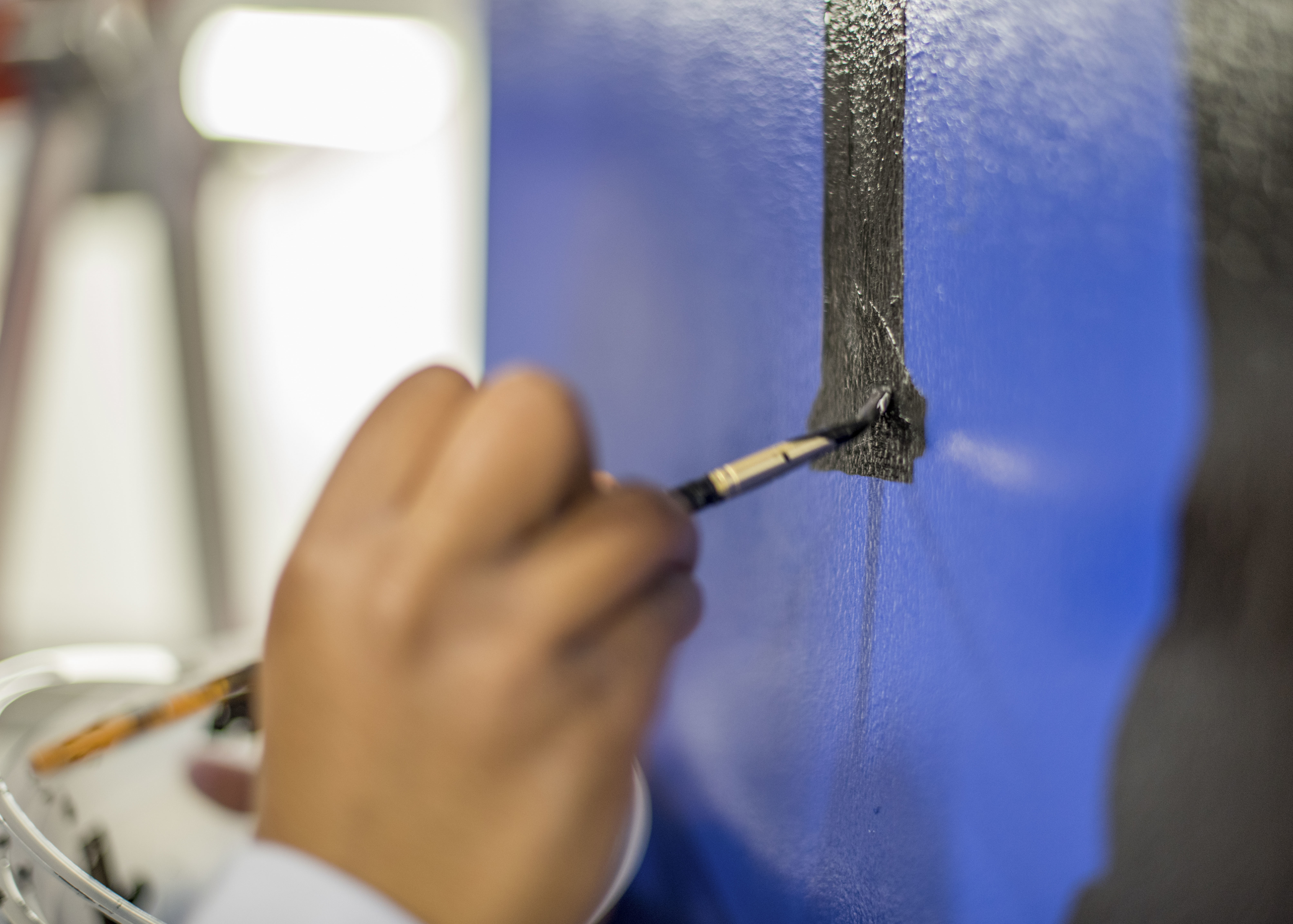 374th SFS Airmen honor Fallen Defender comrades with a mural > Pacific ...