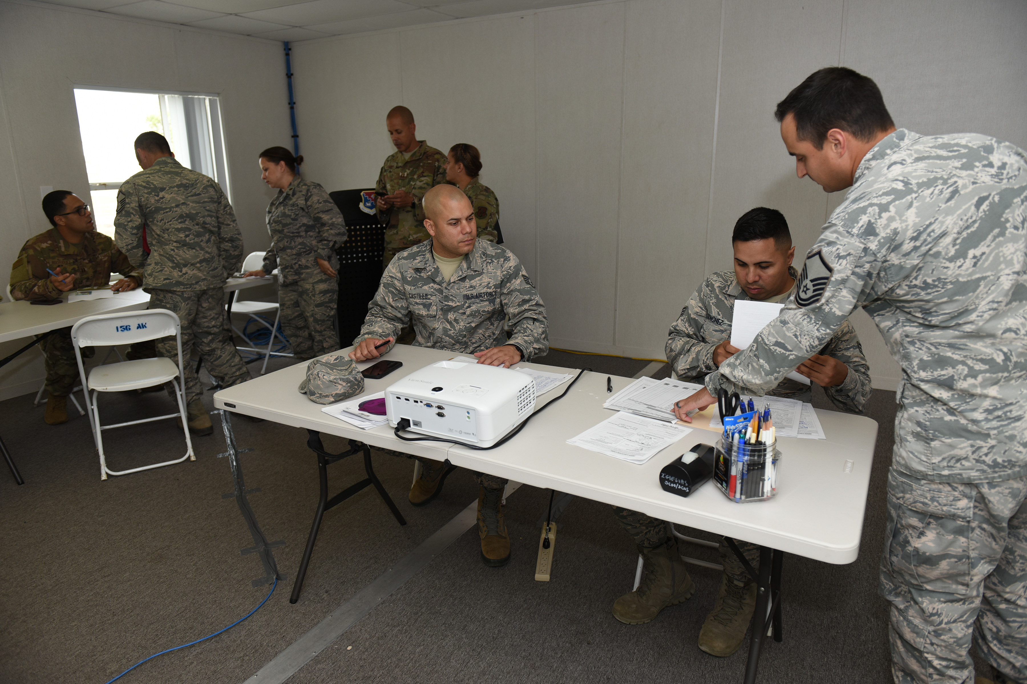 Puerto Rico Airmen process relief support from Ohio, NM ANG > 104th ...