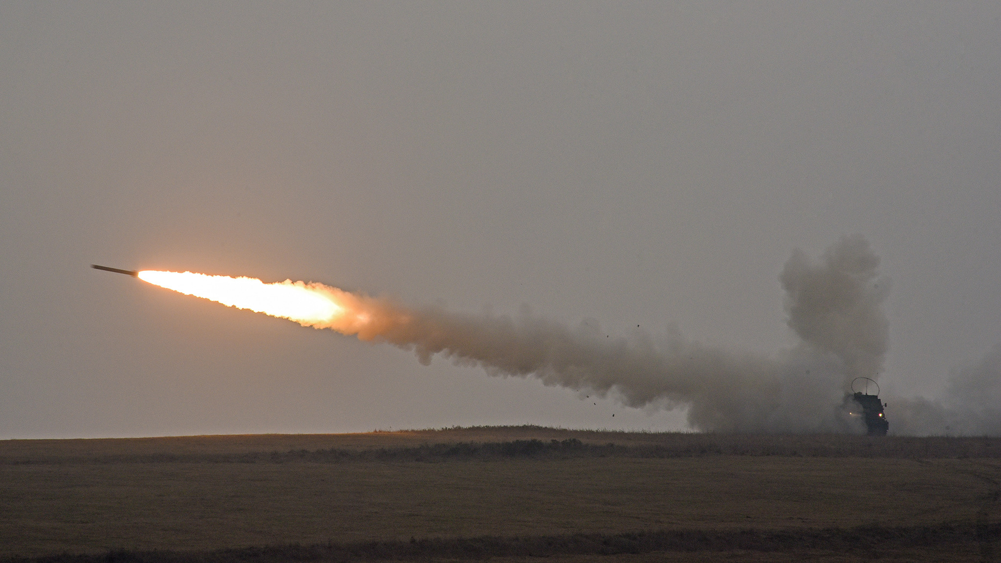 41st Field Artillery Brigade fires the Multiple Launch Rocket System