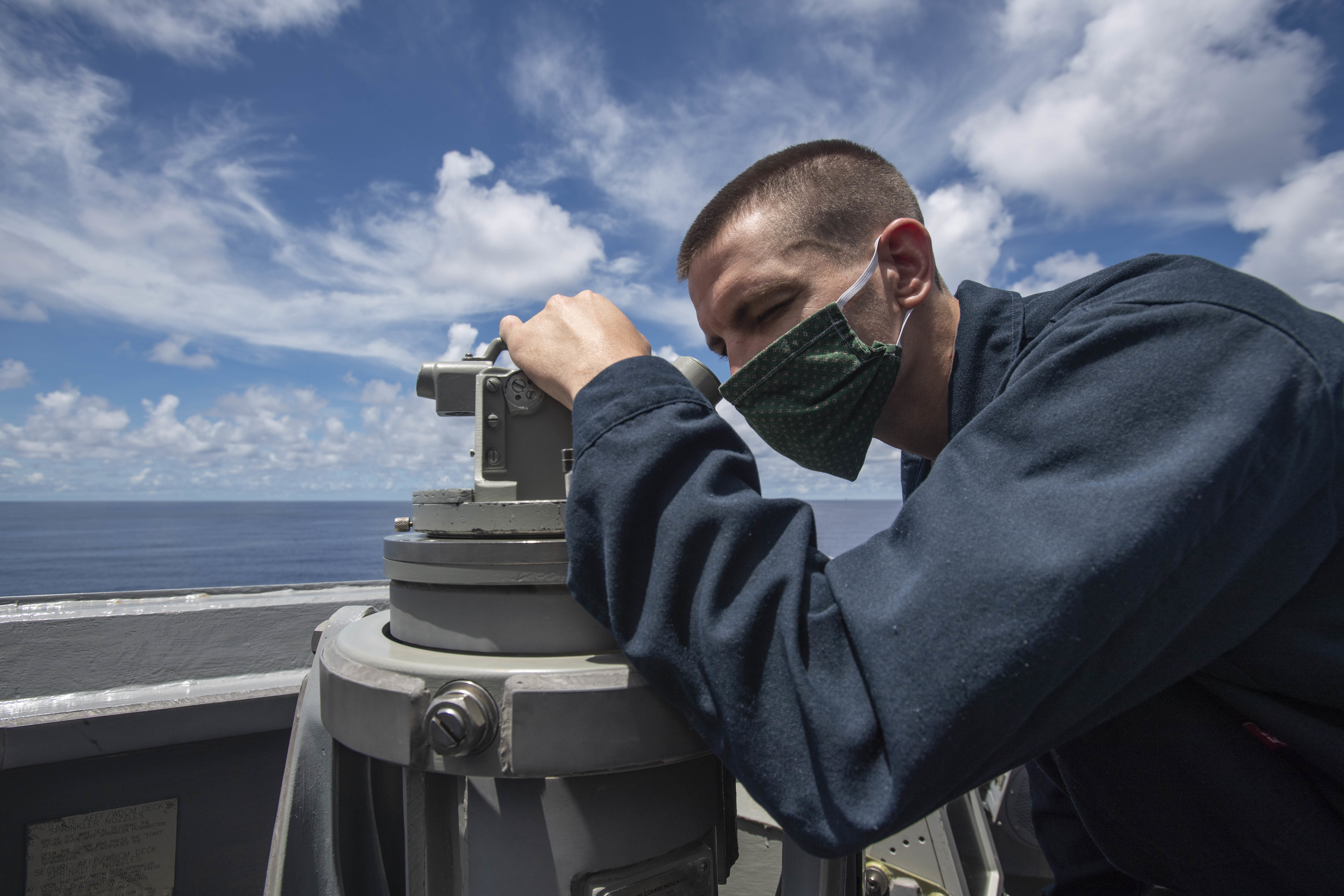 USS Ralph Johnson conducts freedom of navigation operation in South ...