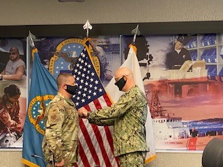 Air Force Col. Patrick R. Launey is awarded the Defense Meritorious ...