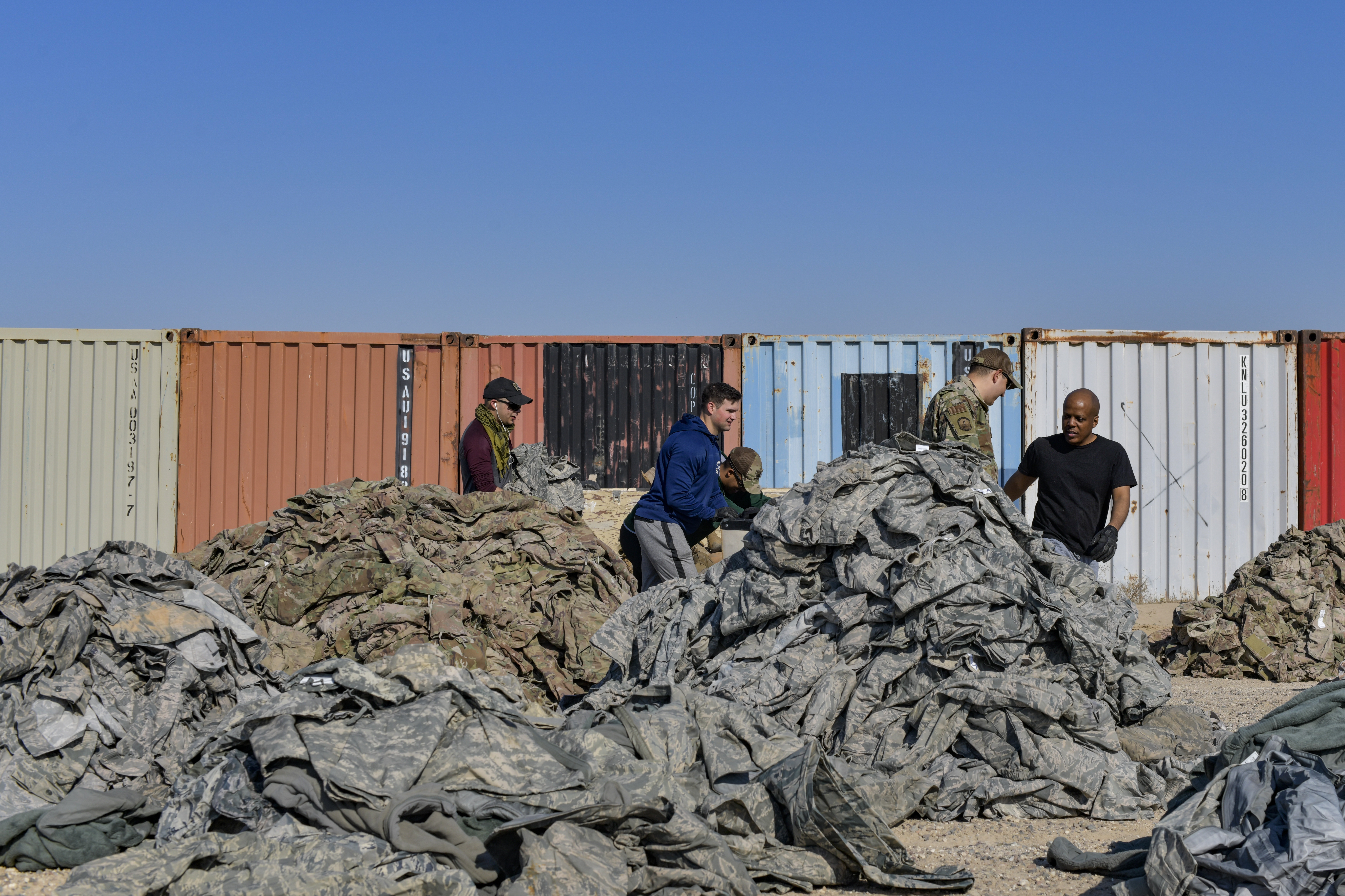 Used deployment uniforms sorted to free-up space and increase OPSEC ...