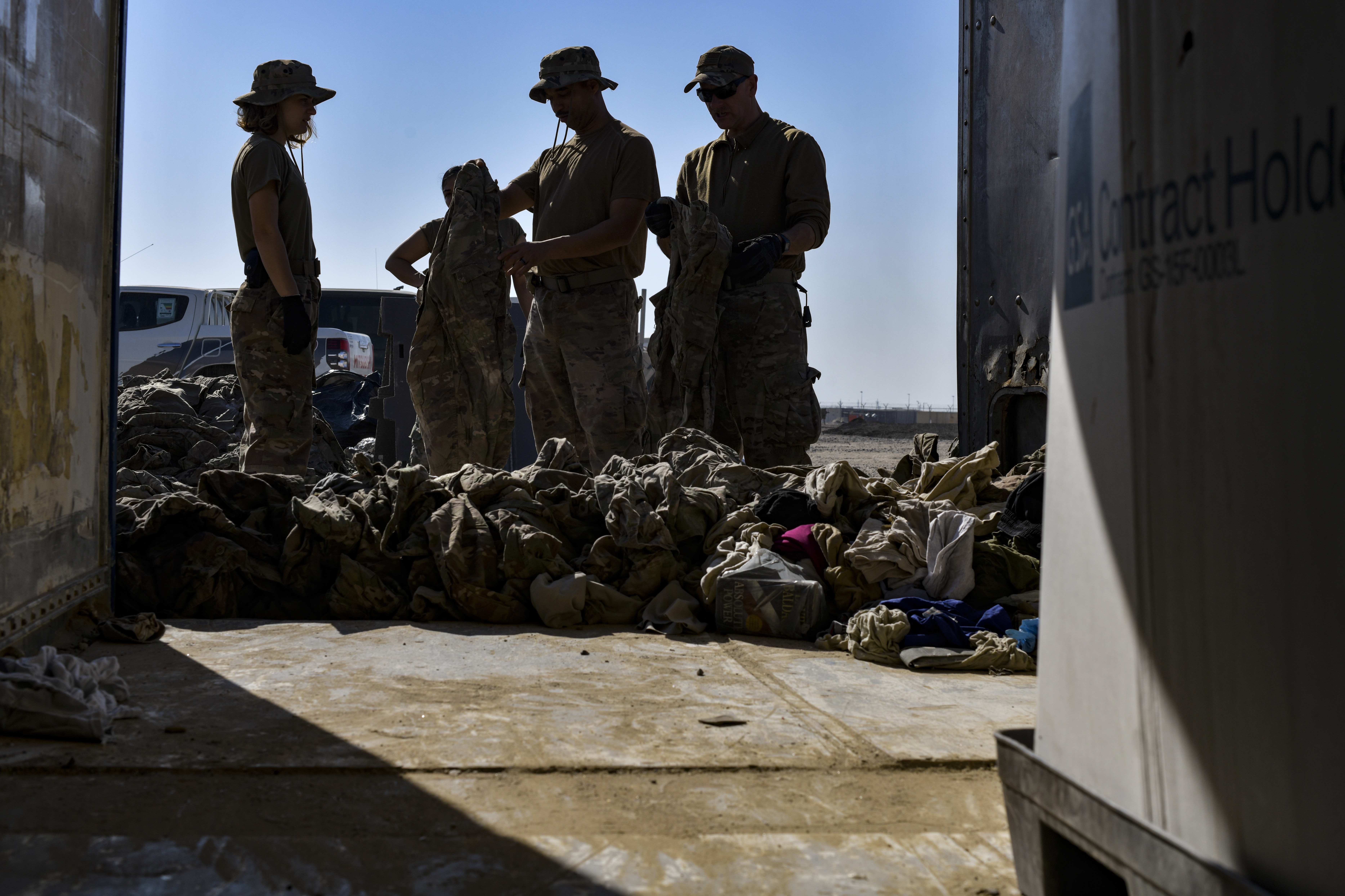 Used deployment uniforms sorted to free-up space and increase OPSEC ...