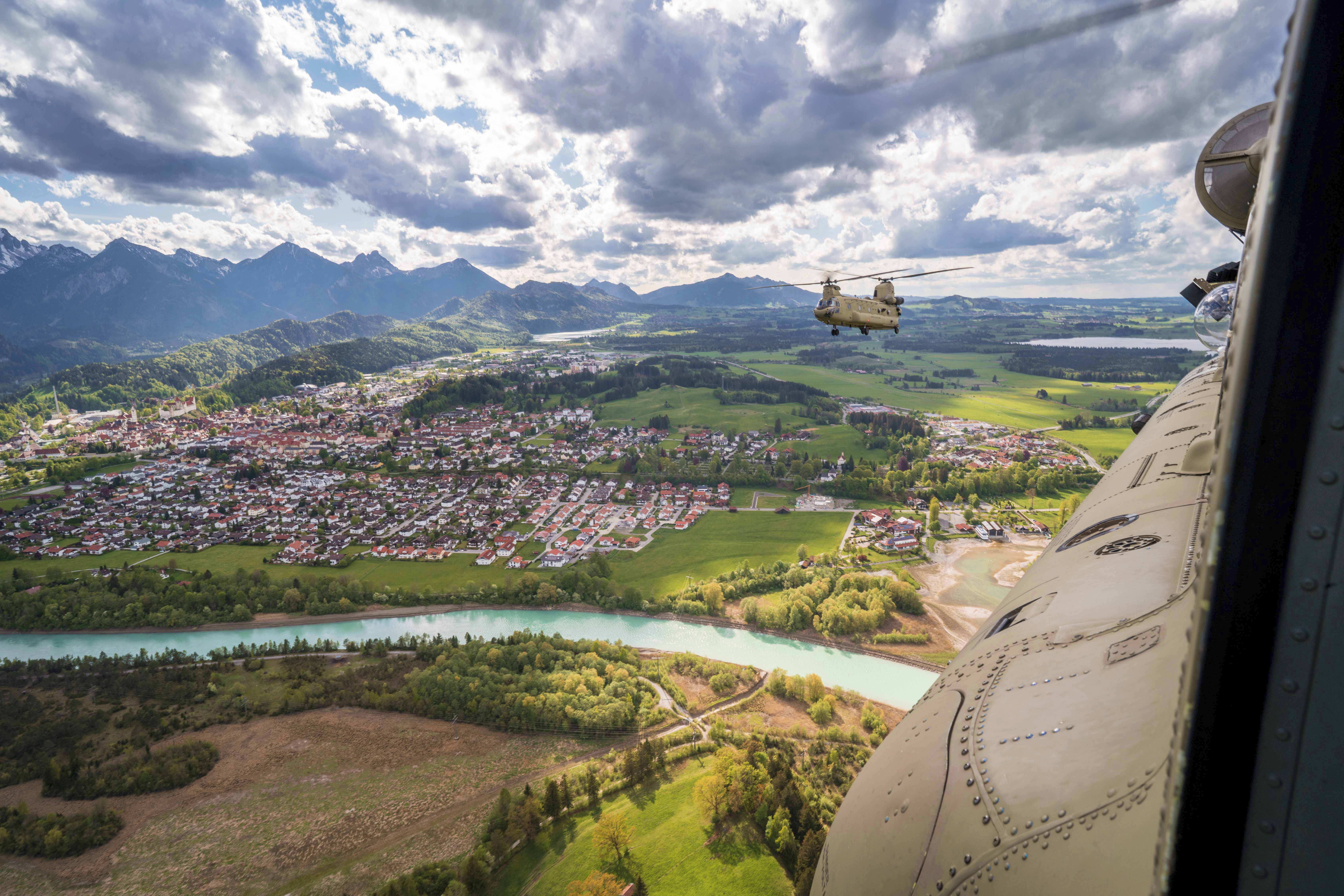Two Army CH-47 Chinooks conduct a high-altitude training flight over ...