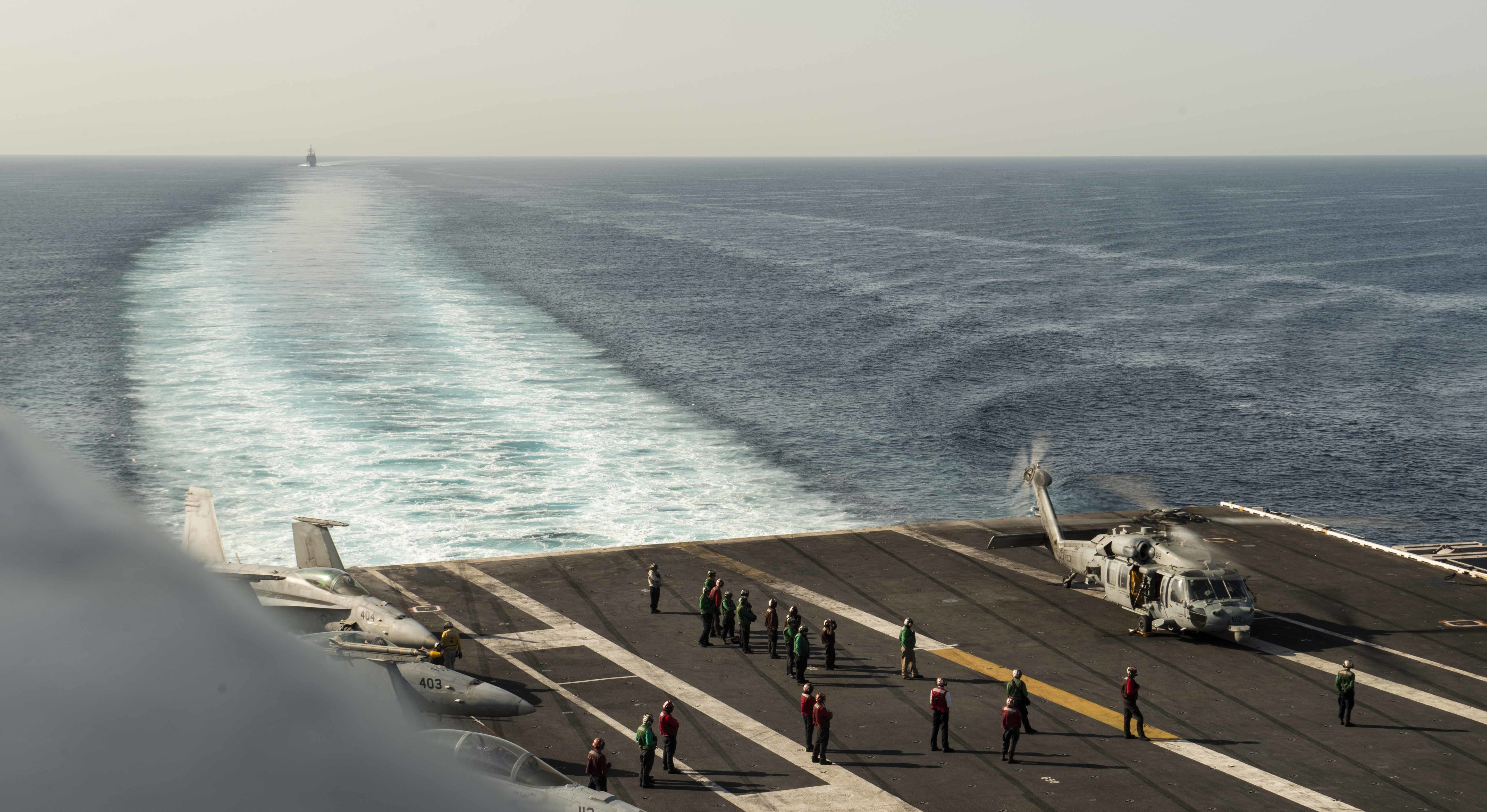USS Nimitz with Accompanying Carrier Strike Group Ships Enter Arabian ...
