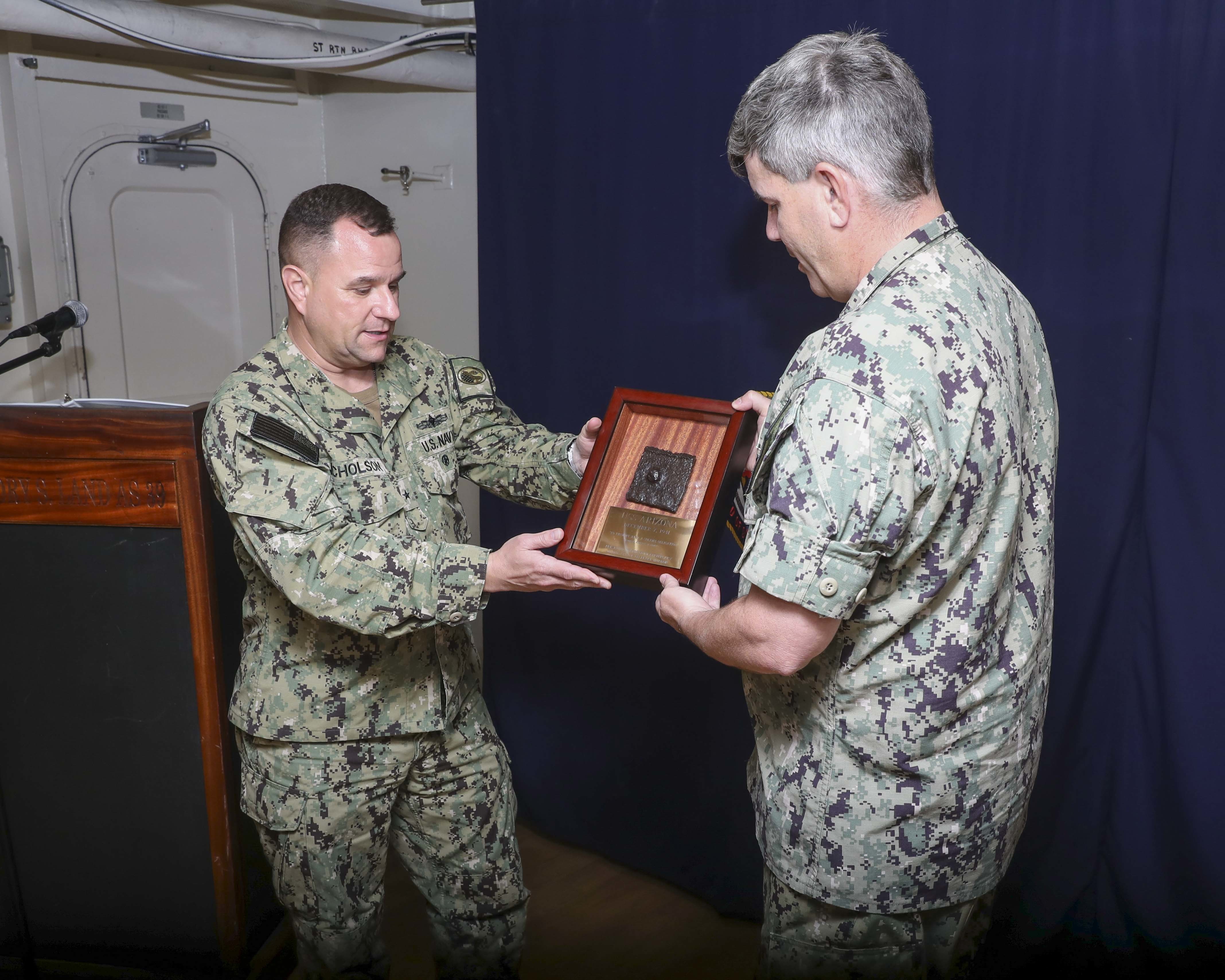 JRM Presents ESL with USS Arizona Relic > United States Navy > News Stories