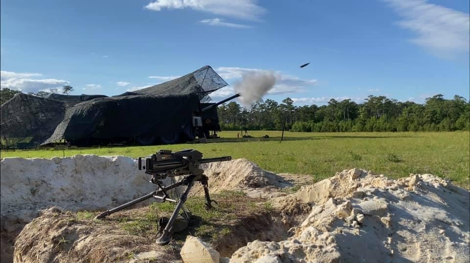 Entrenched MK-19 defending a 1/10 firing position.