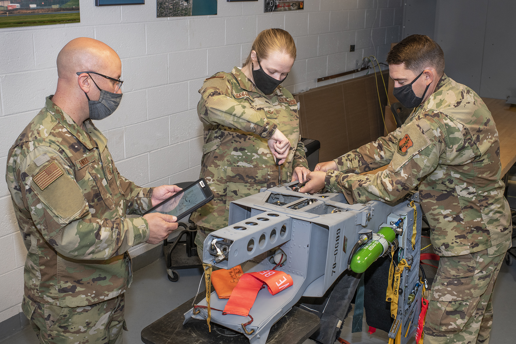 Selfridge Egress technicians maintain on ejection seat