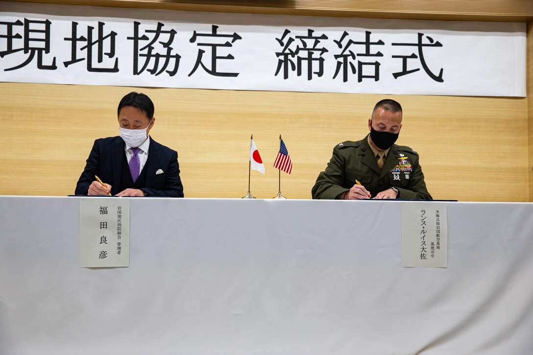 Col. Lance Lewis and Yoshihiko Fukuda co-sign Atago Humanitarian ...