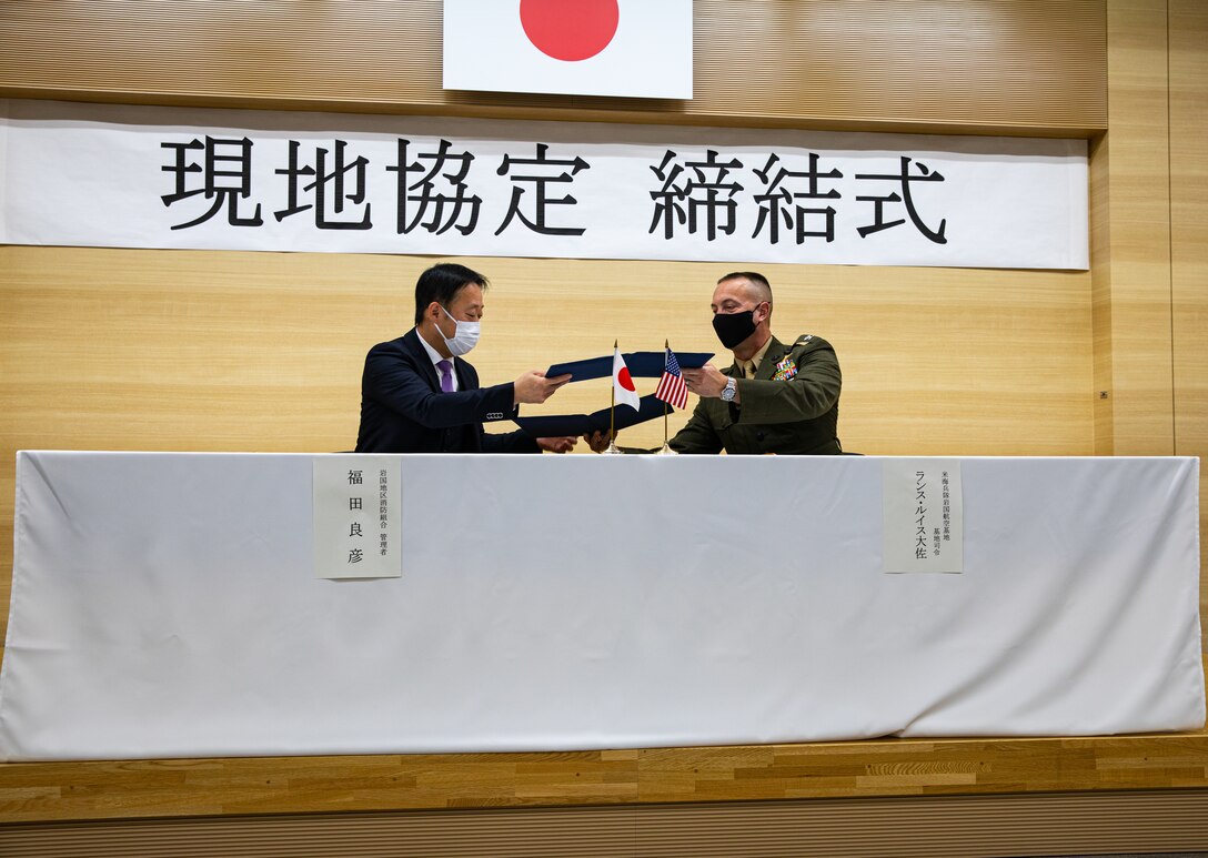 Col. Lance Lewis and Yoshihiko Fukuda co-sign Atago Humanitarian ...
