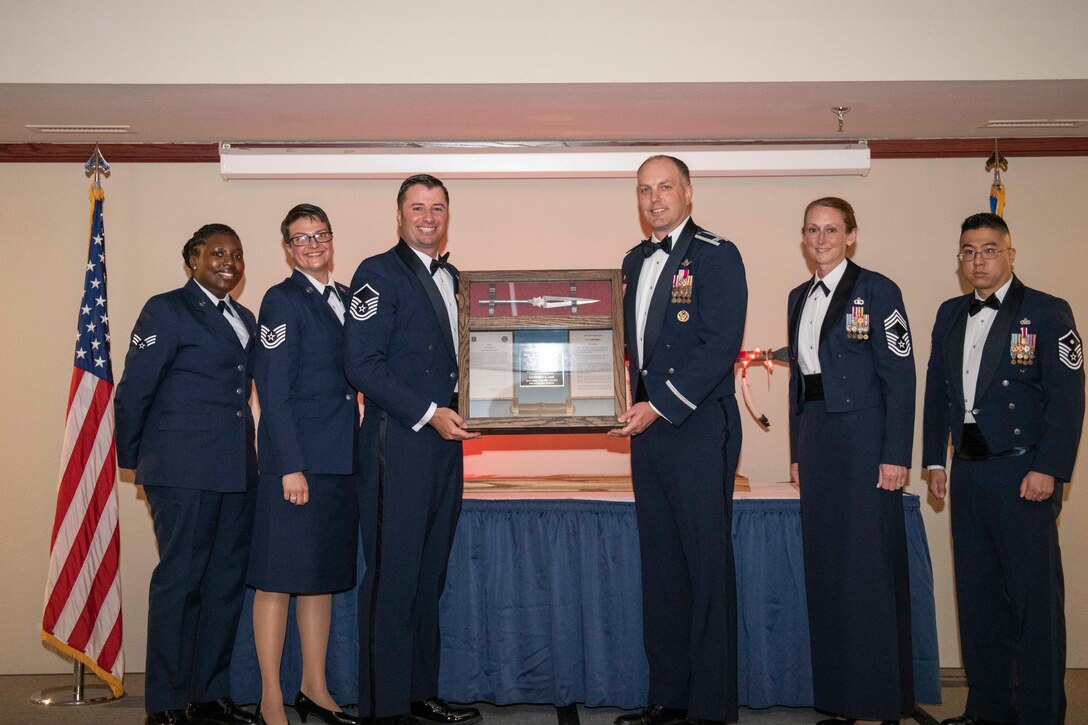 97 AMW command team receives highest honor