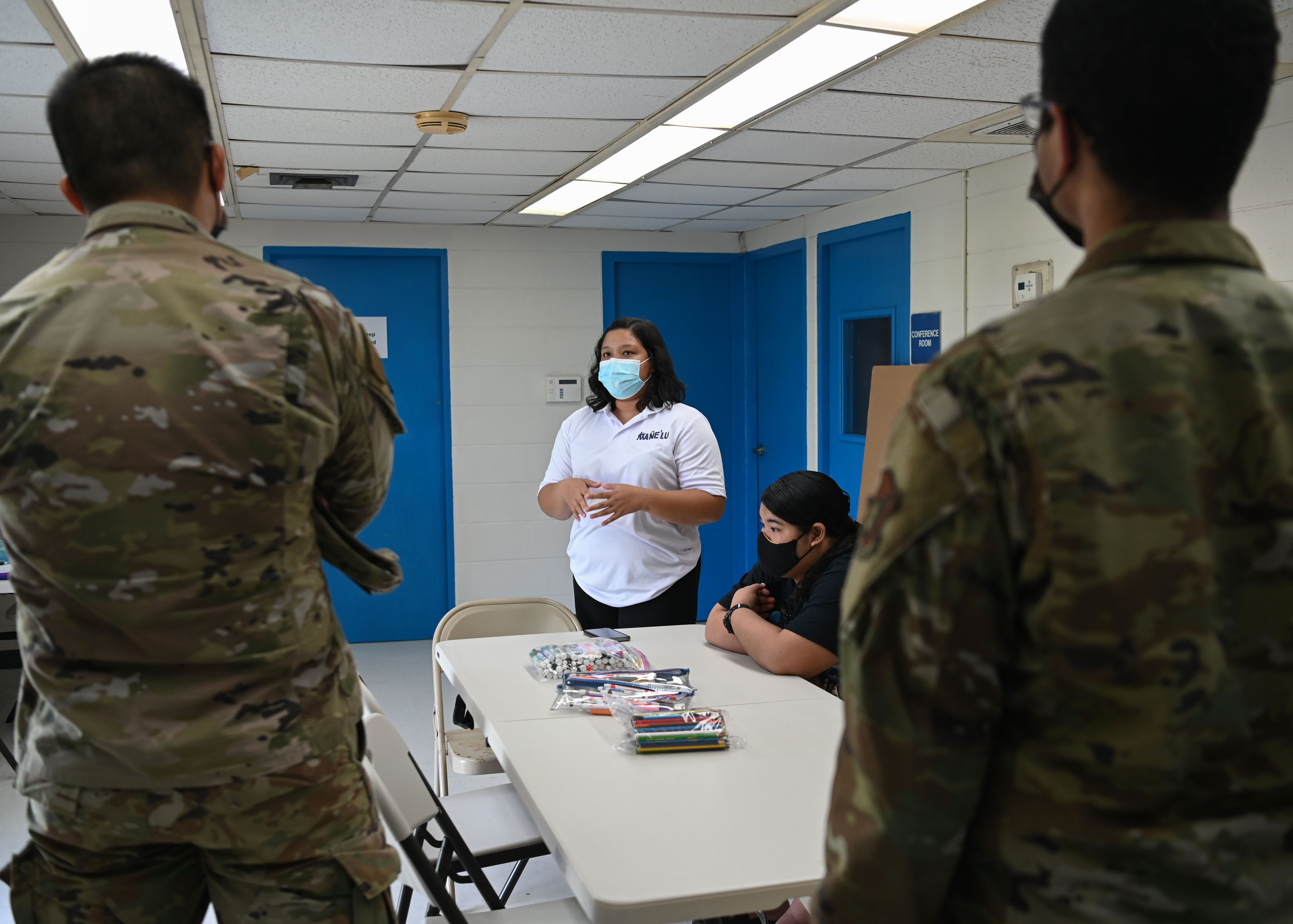 Airmen and Mañe'lu children decorate boxes for OCD > Andersen Air Force ...