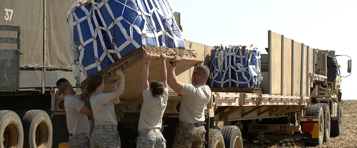 Soldiers recover air-dropped pallets at the Alzey drop zone