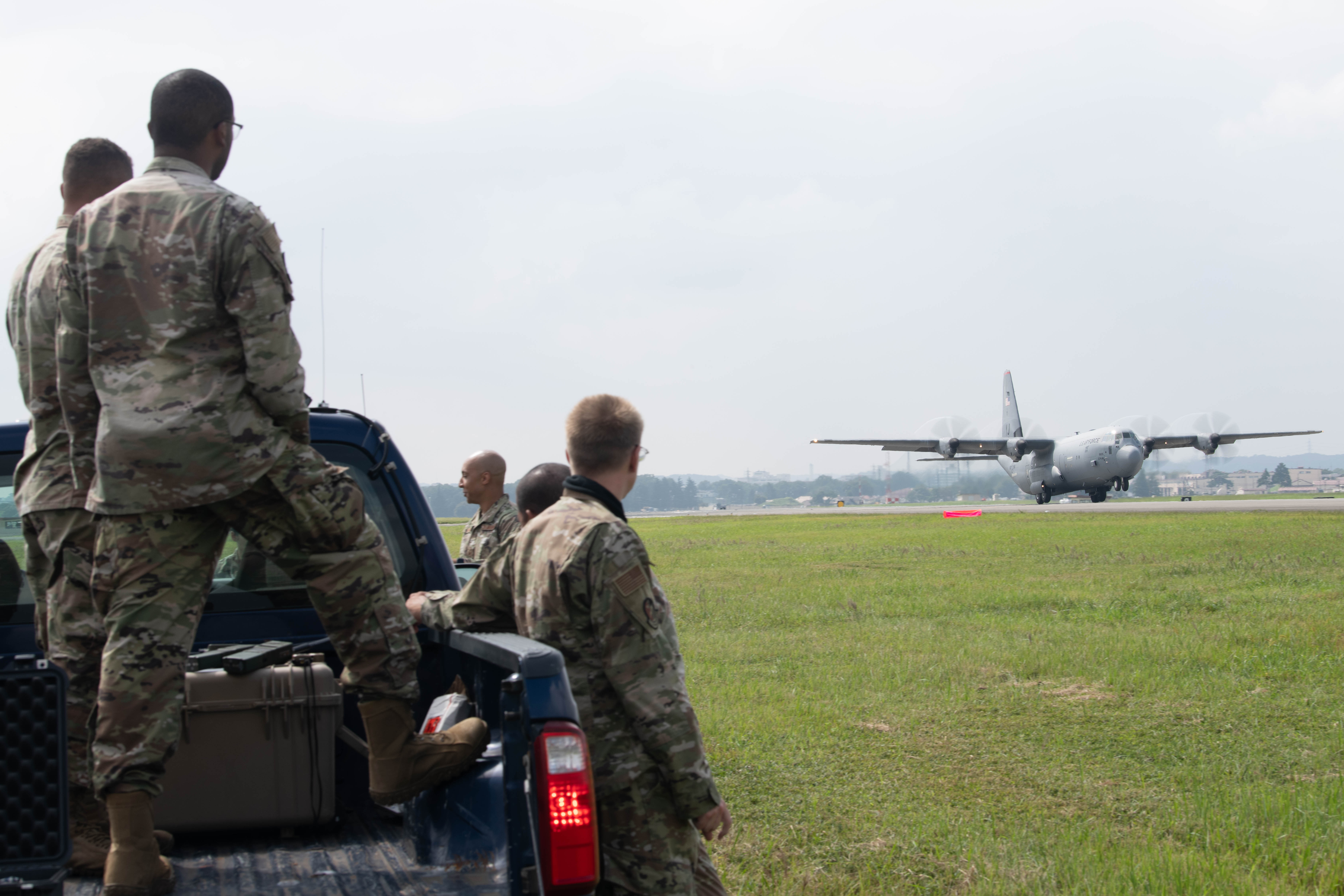 Yokota air traffic controllers conduct infield flightline operations ...