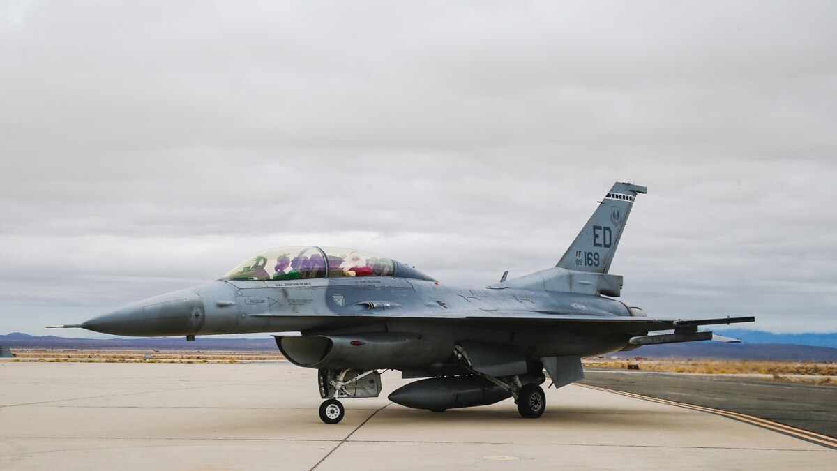 Santa Claus upgrades from reindeer... to Fighting Falcon to spread ...