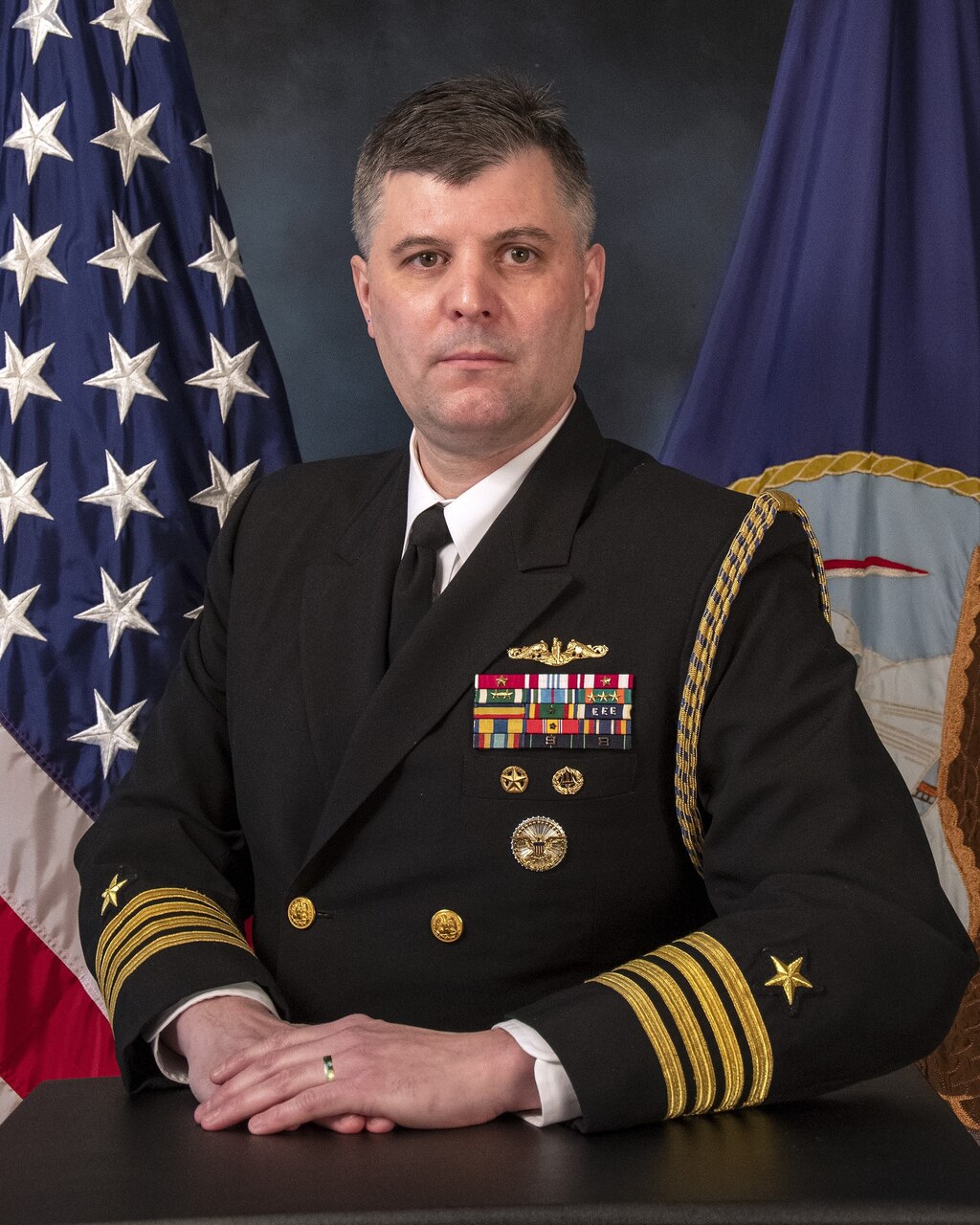 cos > Commander, Navy Installations Command > Bio Detail