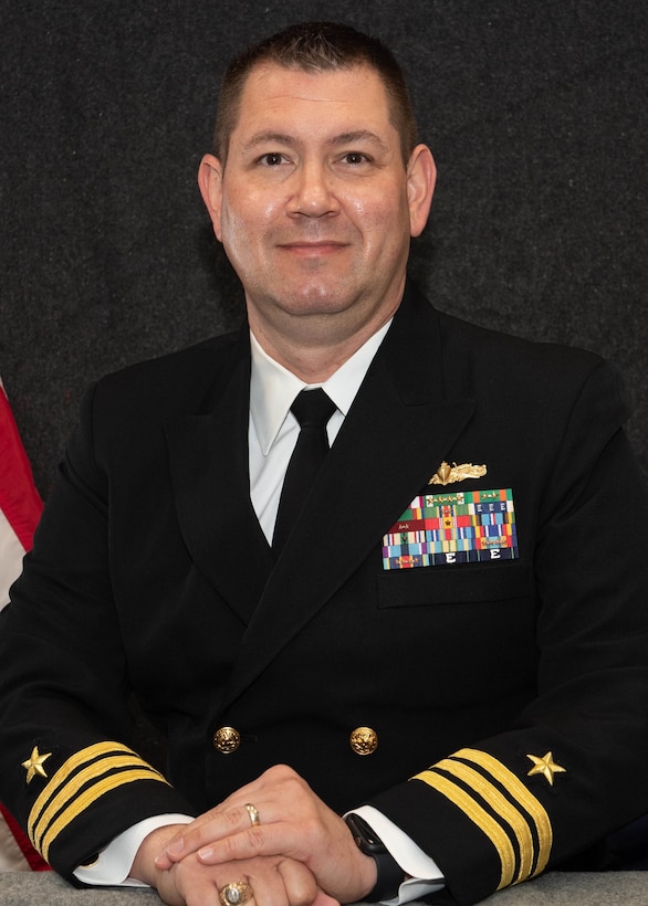 Commander Cameron D. Dennis