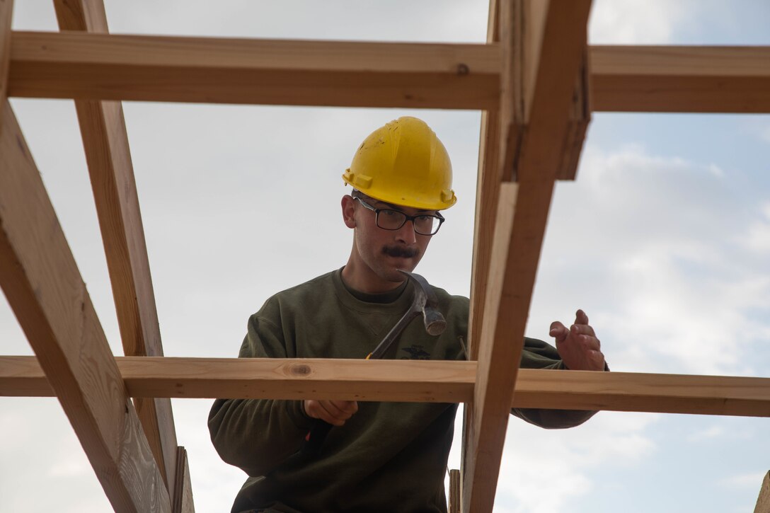 Marine Engineers and Navy Seabees establish construction site during ...