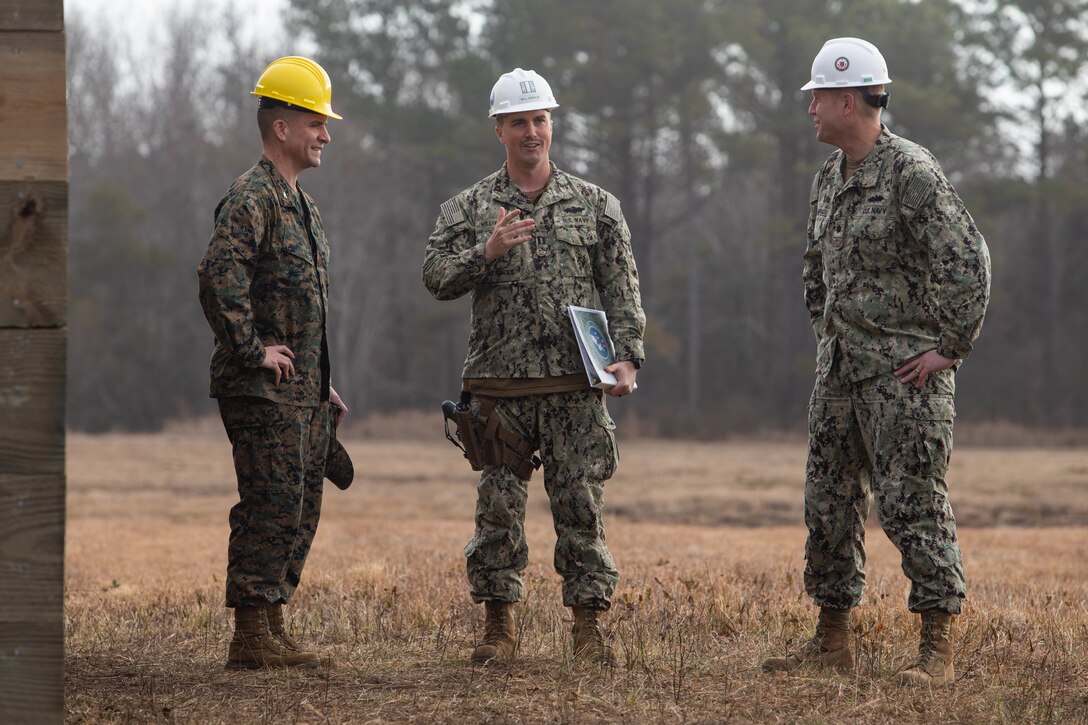 Marine Engineers and Navy Seabees establish construction site during ...