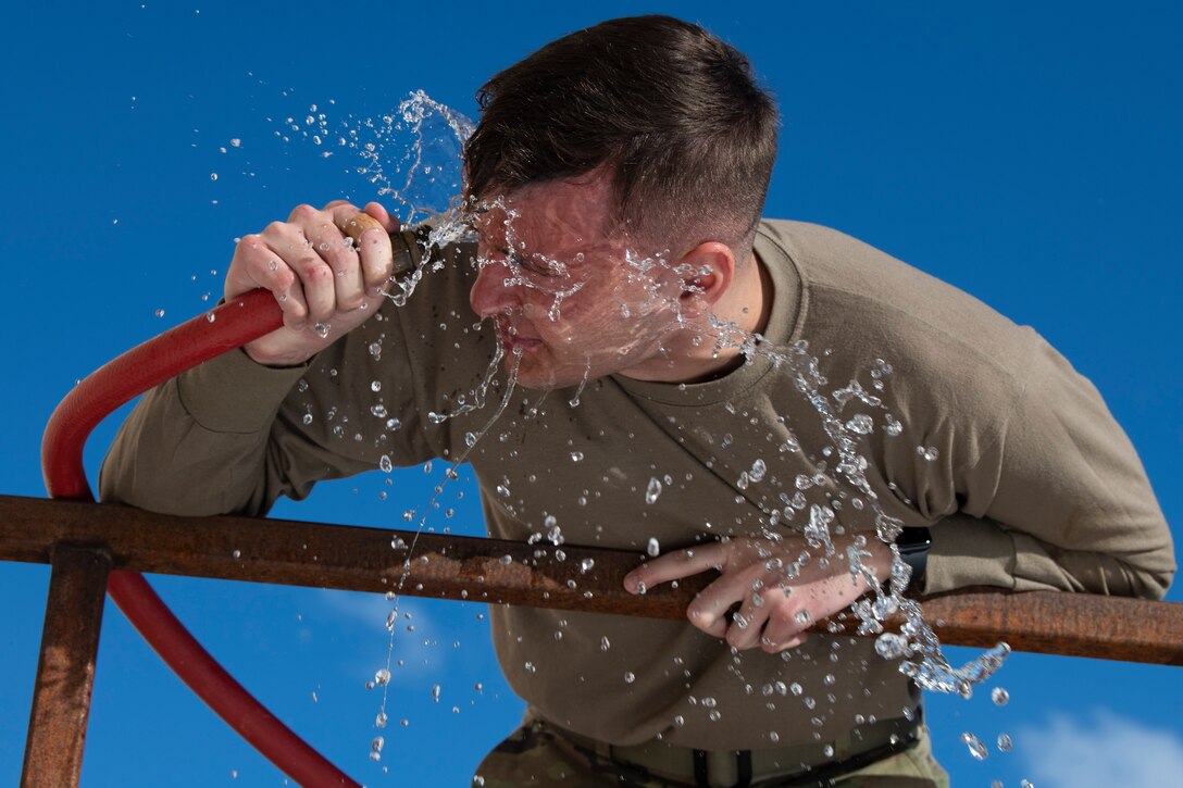 JBER defenders conduct OC spray training