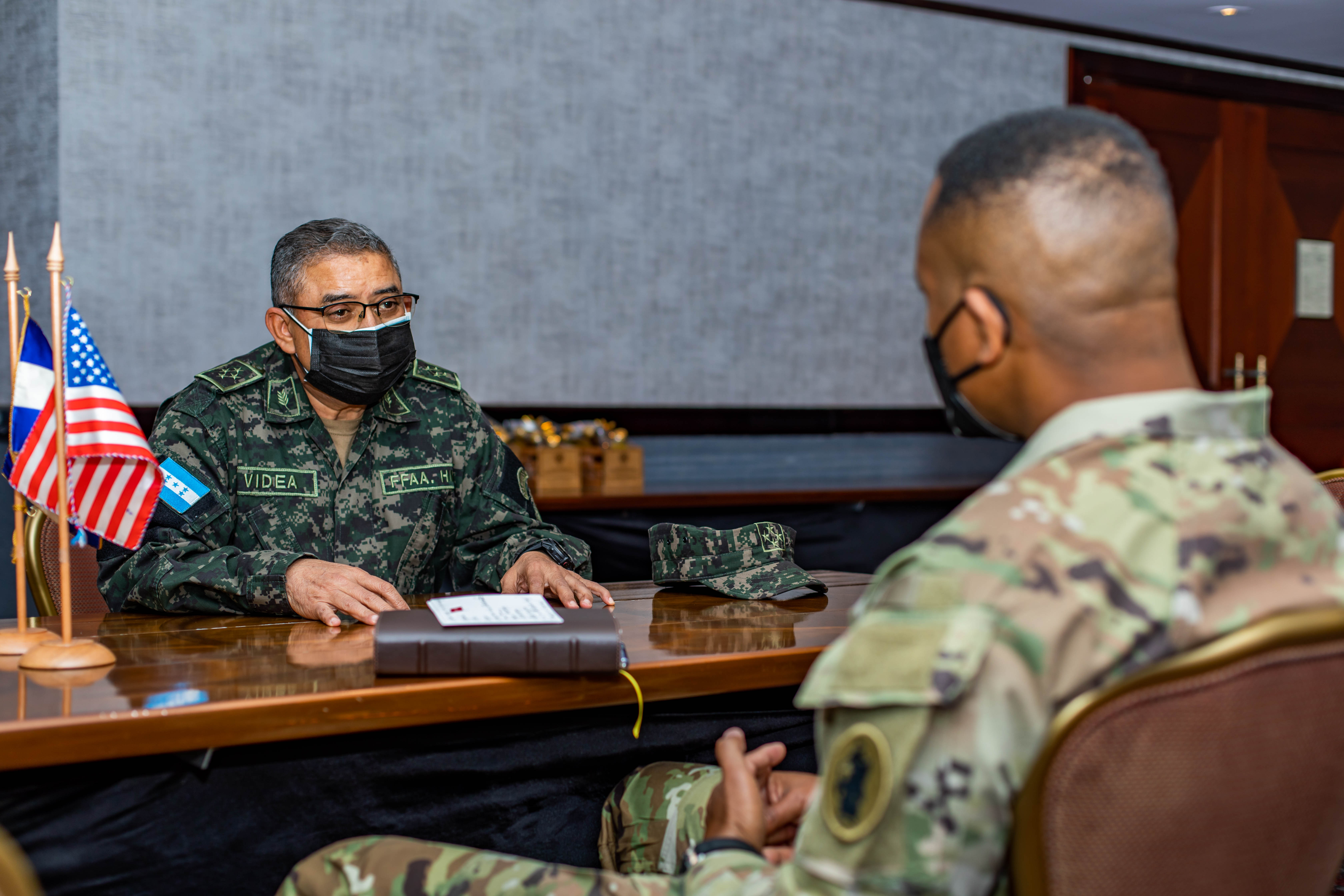 U.S. and Honduran army delegations speak during the CENTAM Working Group
