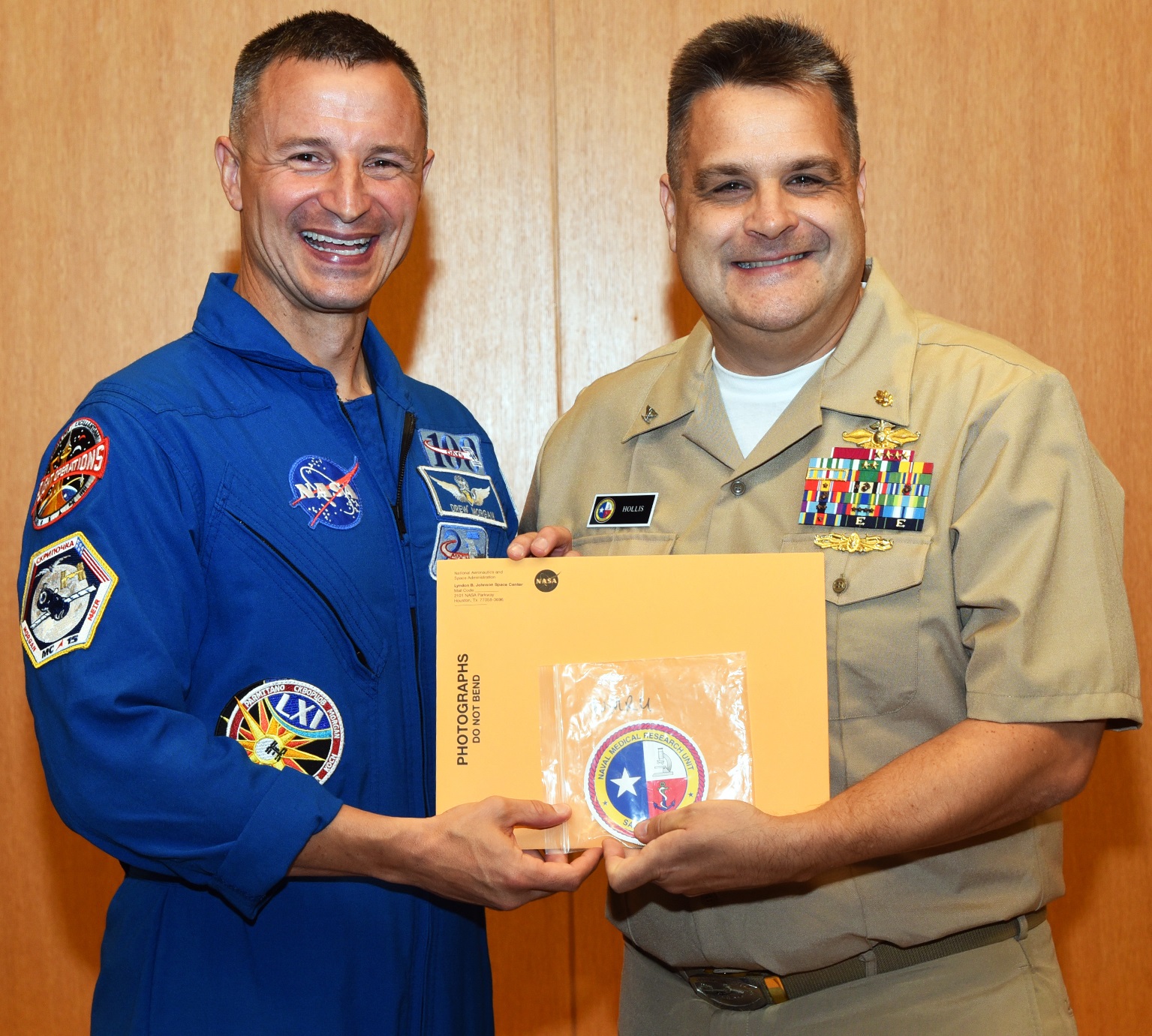 Items taken to space return to NAMRU San Antonio > Joint Base San ...