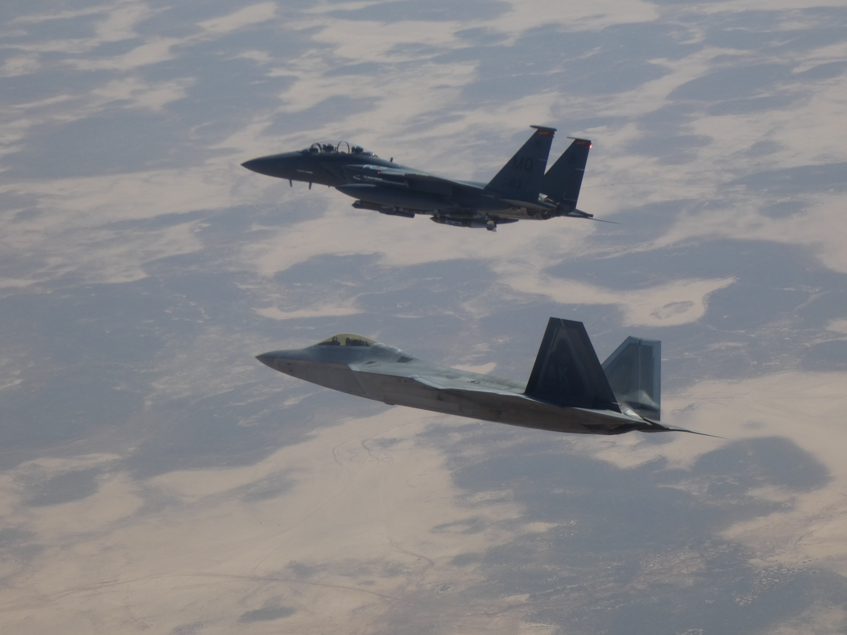 F-22 Raptors and F-15E Strike Eagles work in tandem in the CENTCOM Area ...