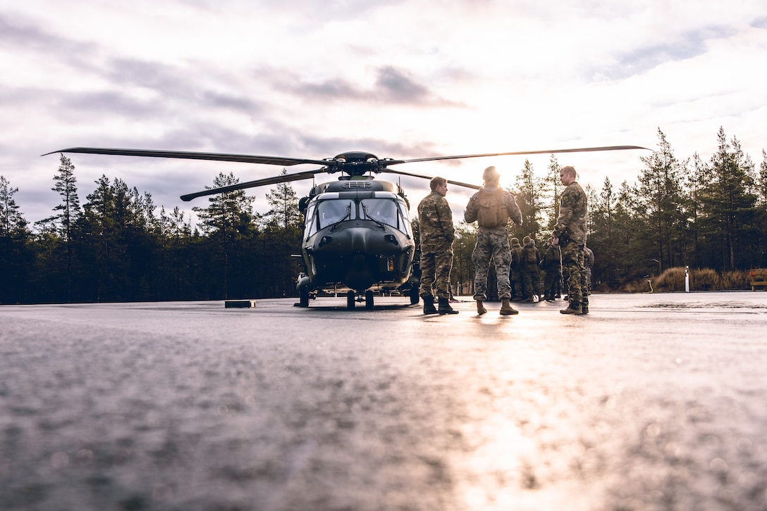 U.S. Marines conduct helicopter support team resupply with Finnish Soldiers