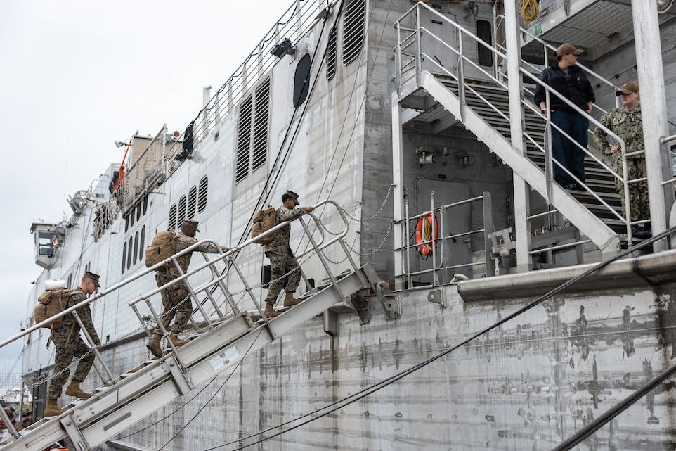 II Marine Expeditionary Force boards the USNS Trenton in the ...