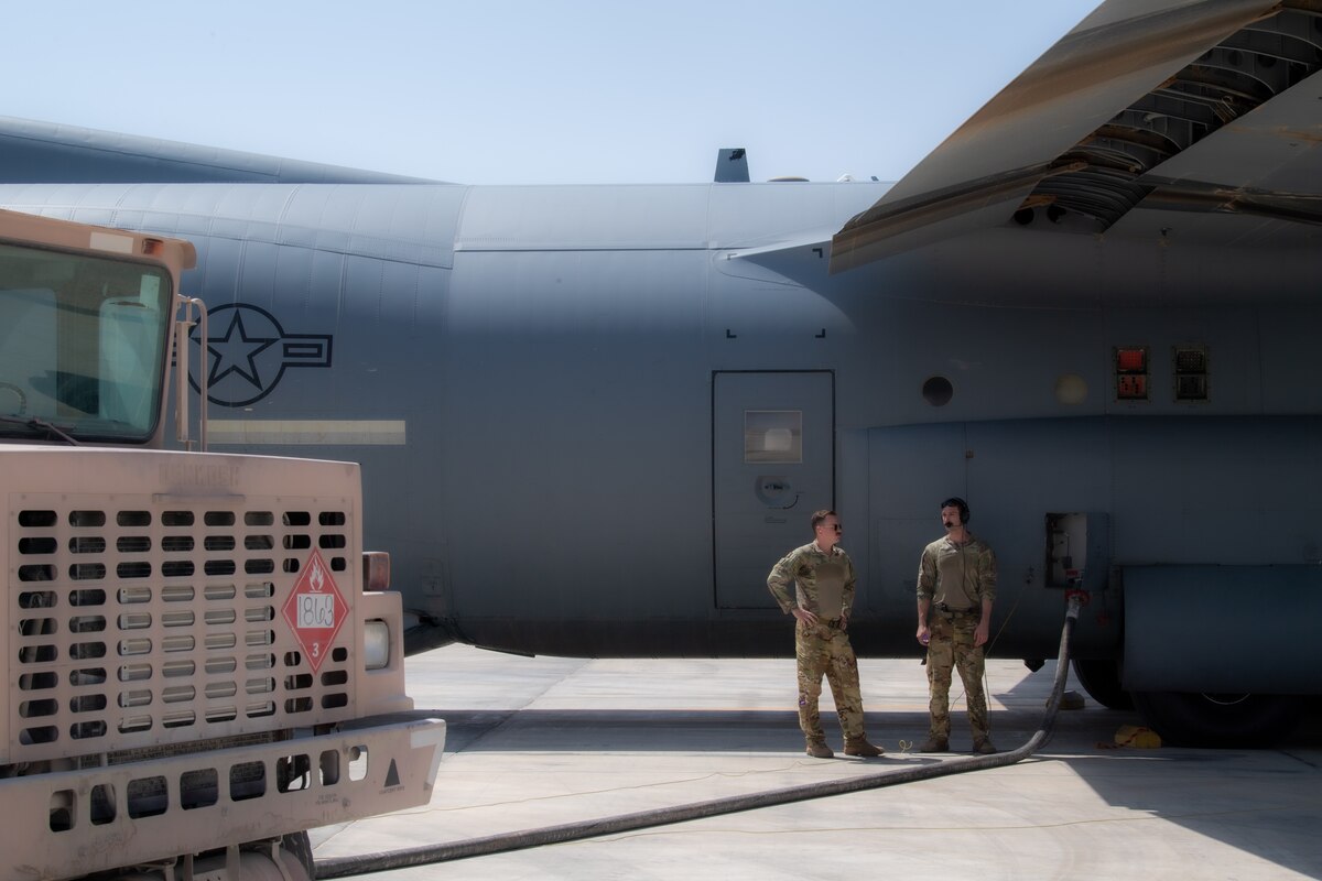 332d Expeditionary Logistics Readiness Squadron loads cargo onto C-130 ...