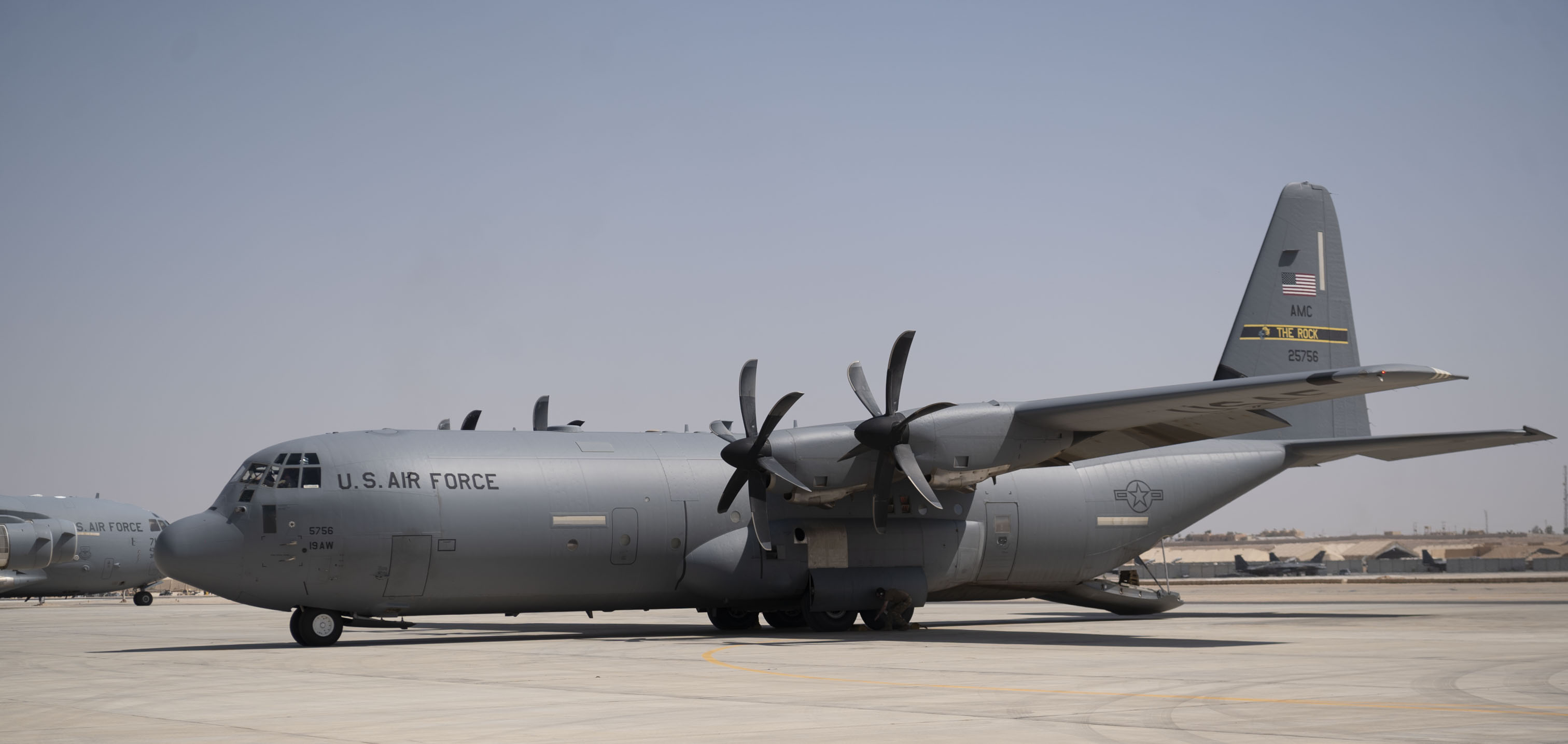 332d Expeditionary Logistics Readiness Squadron loads cargo onto C-130 ...