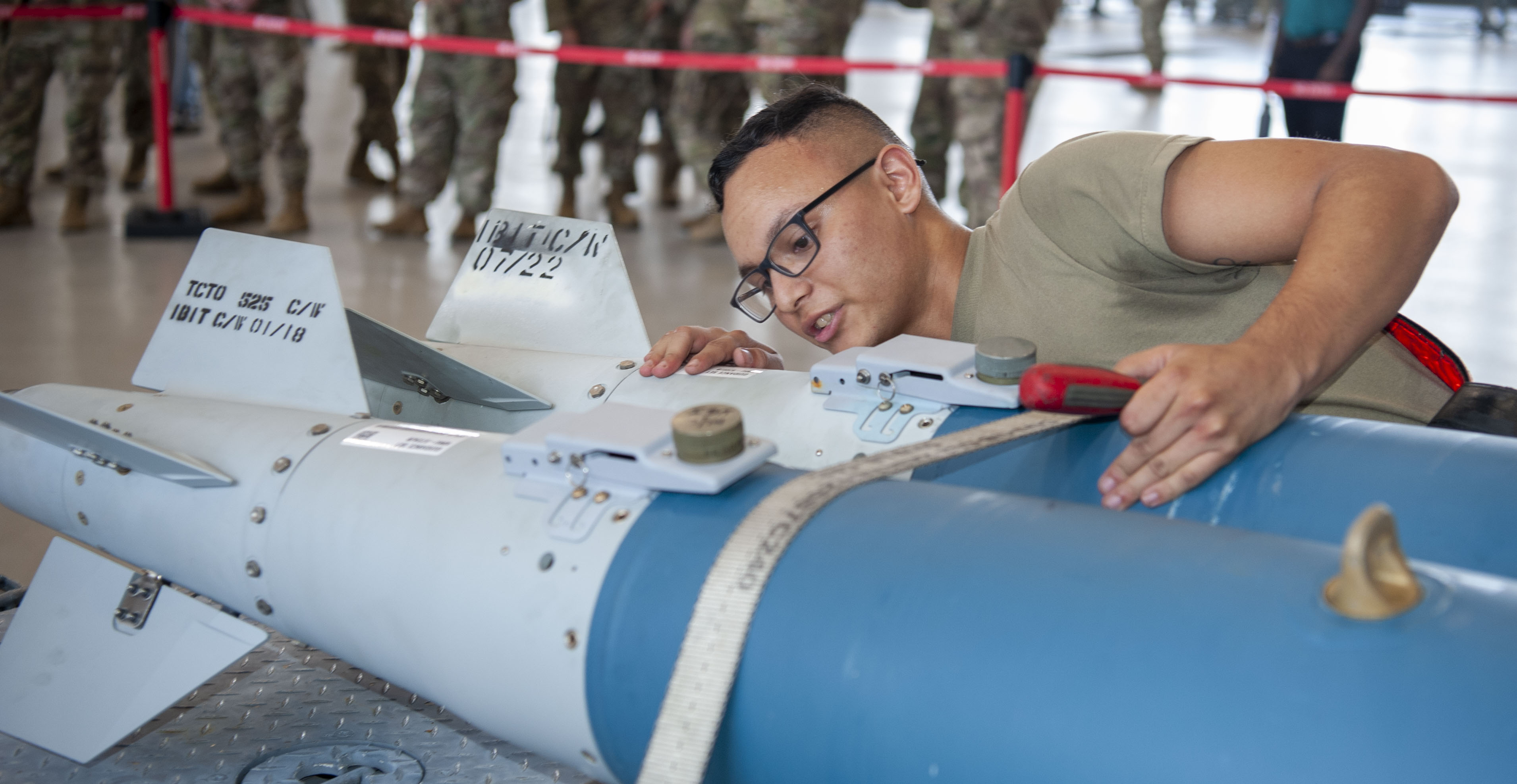 Maintainers hold weapons load, bomb building events > Edwards Air Force ...