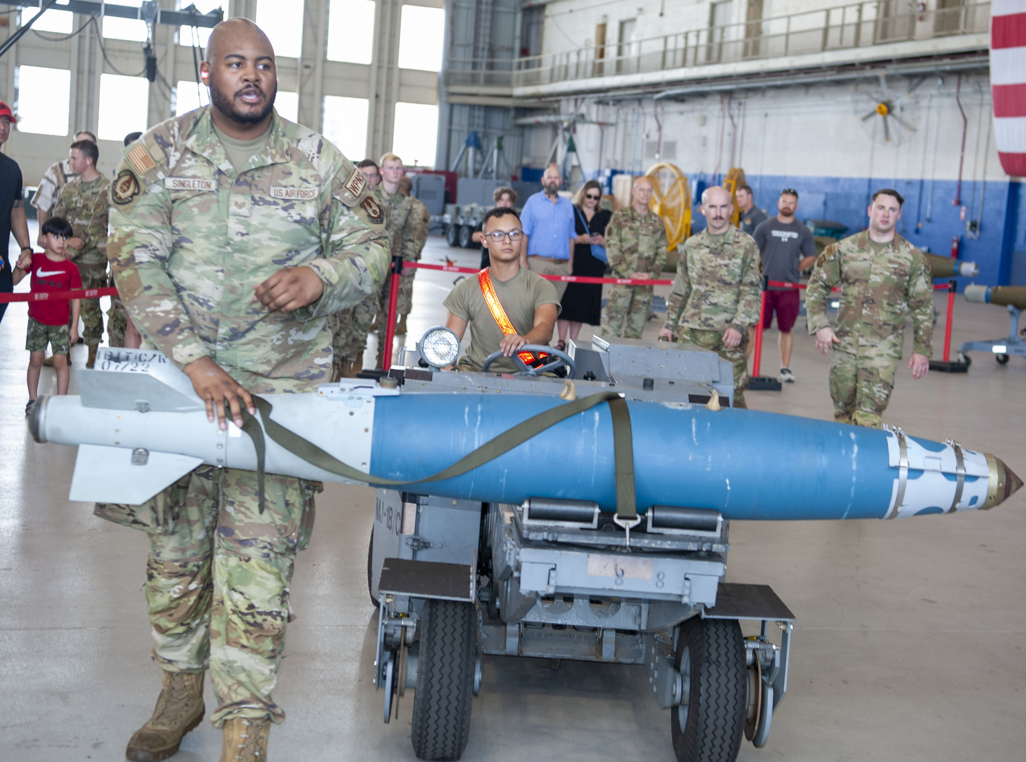 Maintainers hold weapons load, bomb building events > Air Force ...