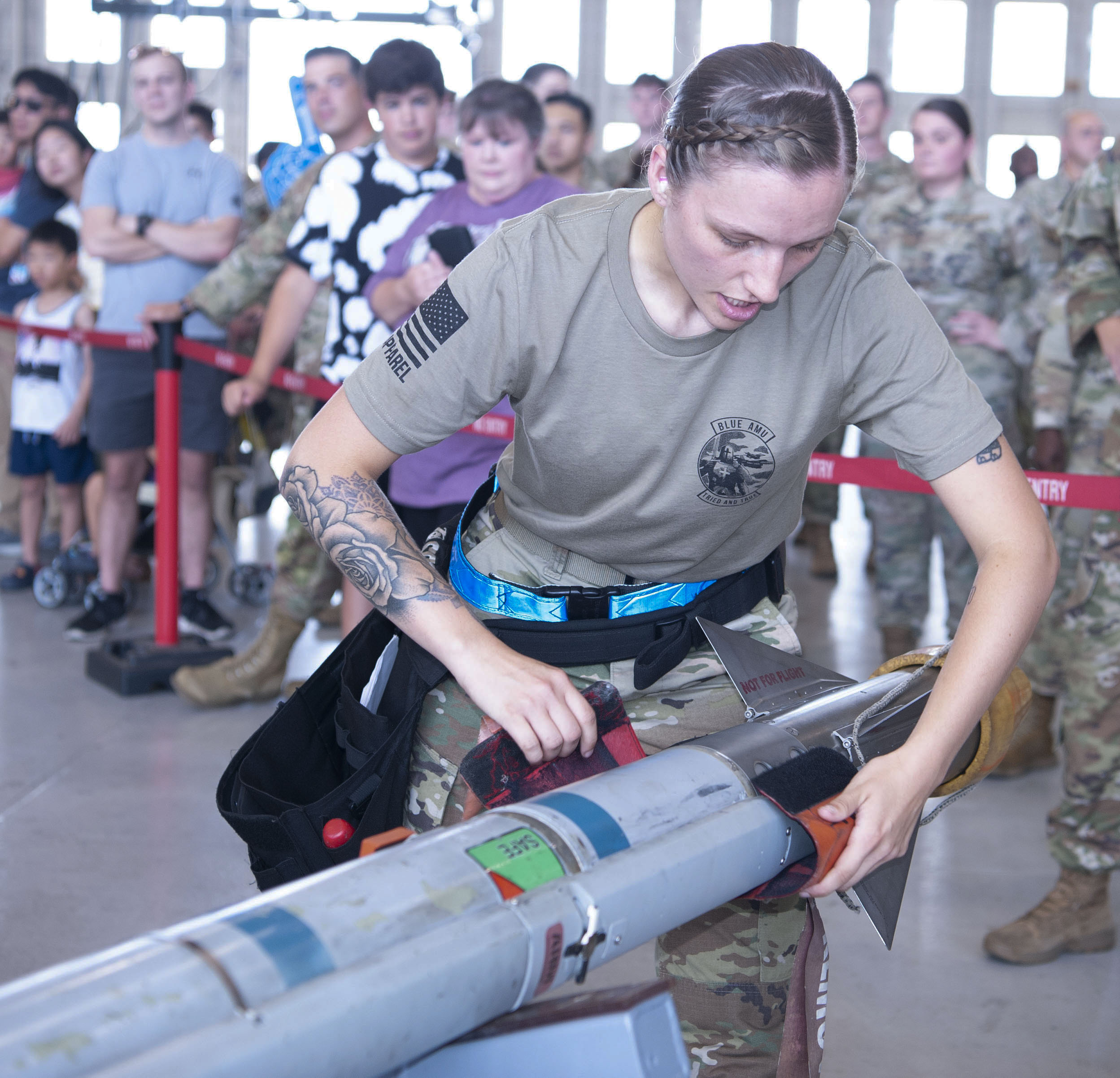 Maintainers hold weapons load, bomb building events > Air Force ...