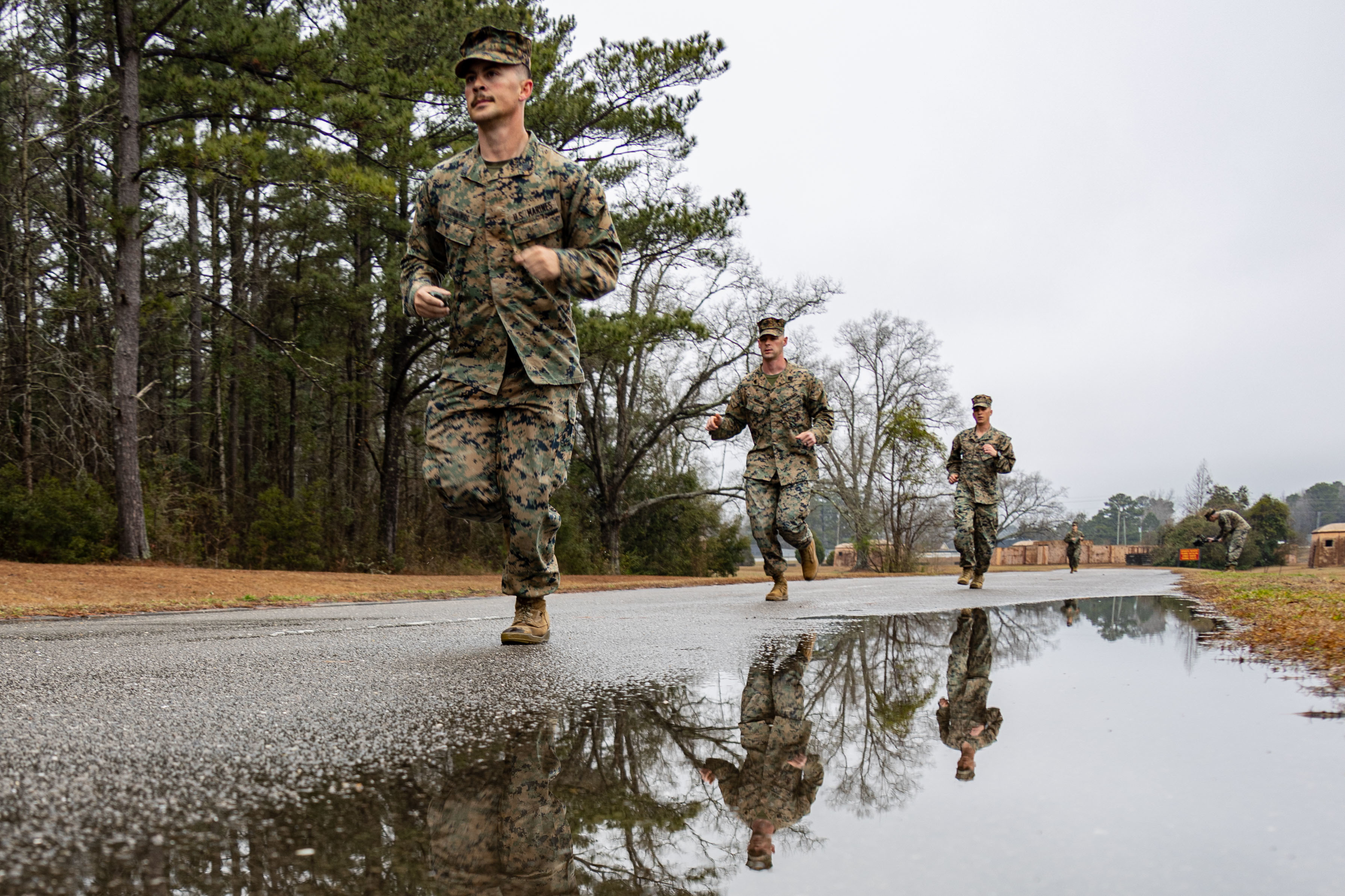 Combat Instructor School Students Determine 100 Meter Pace Count Run