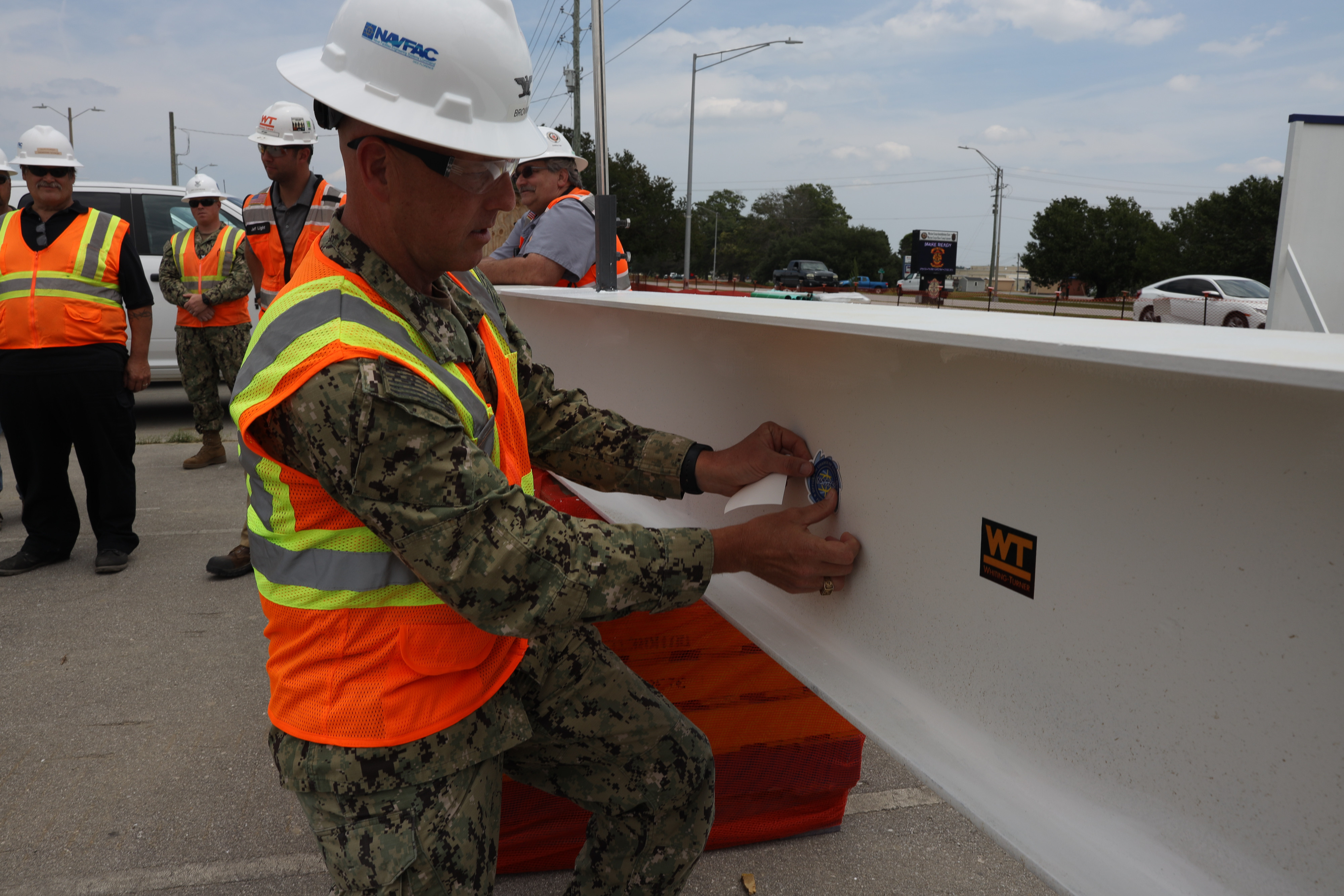 New Legal Services building receives special beam commemorating ...