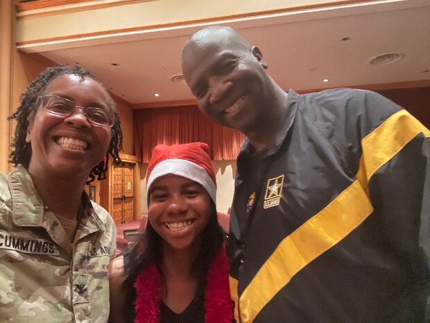 Col. Dominique Cummings with her husband and daughter